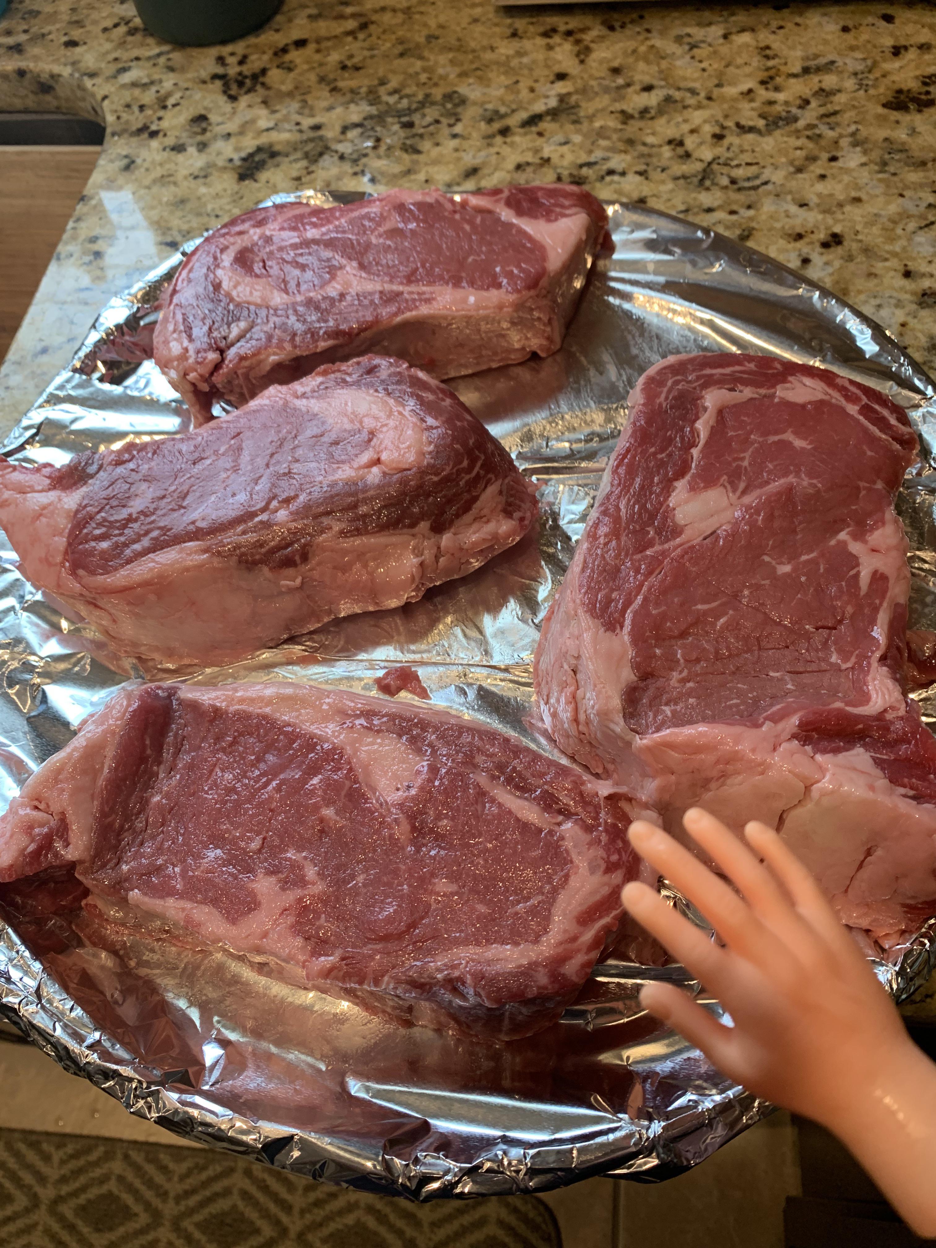 These steaks are HUGE (hand for scale) | Scrolller