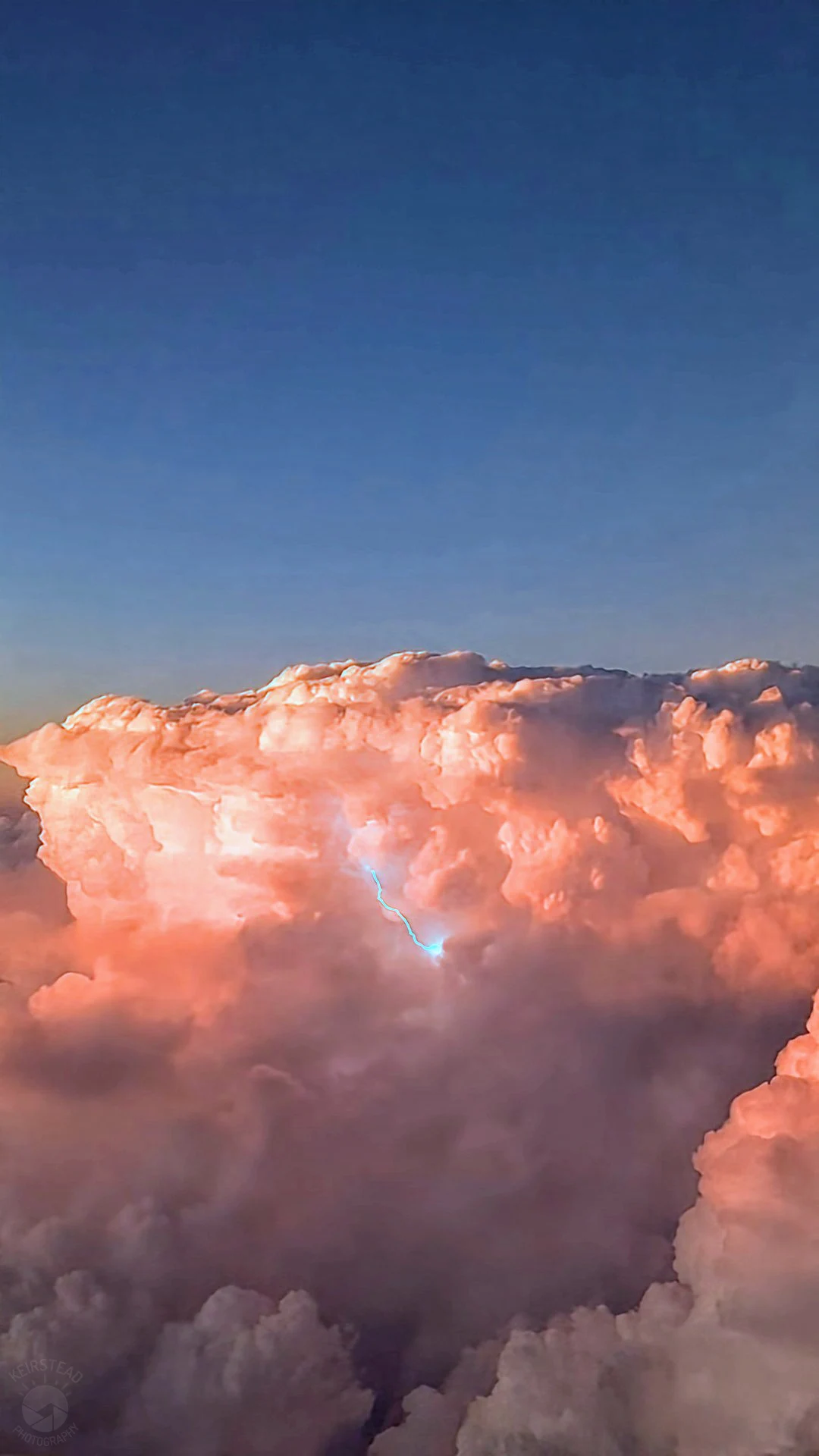 Cloud lightning at sunset over the Atlantic taken from a plane | Scrolller
