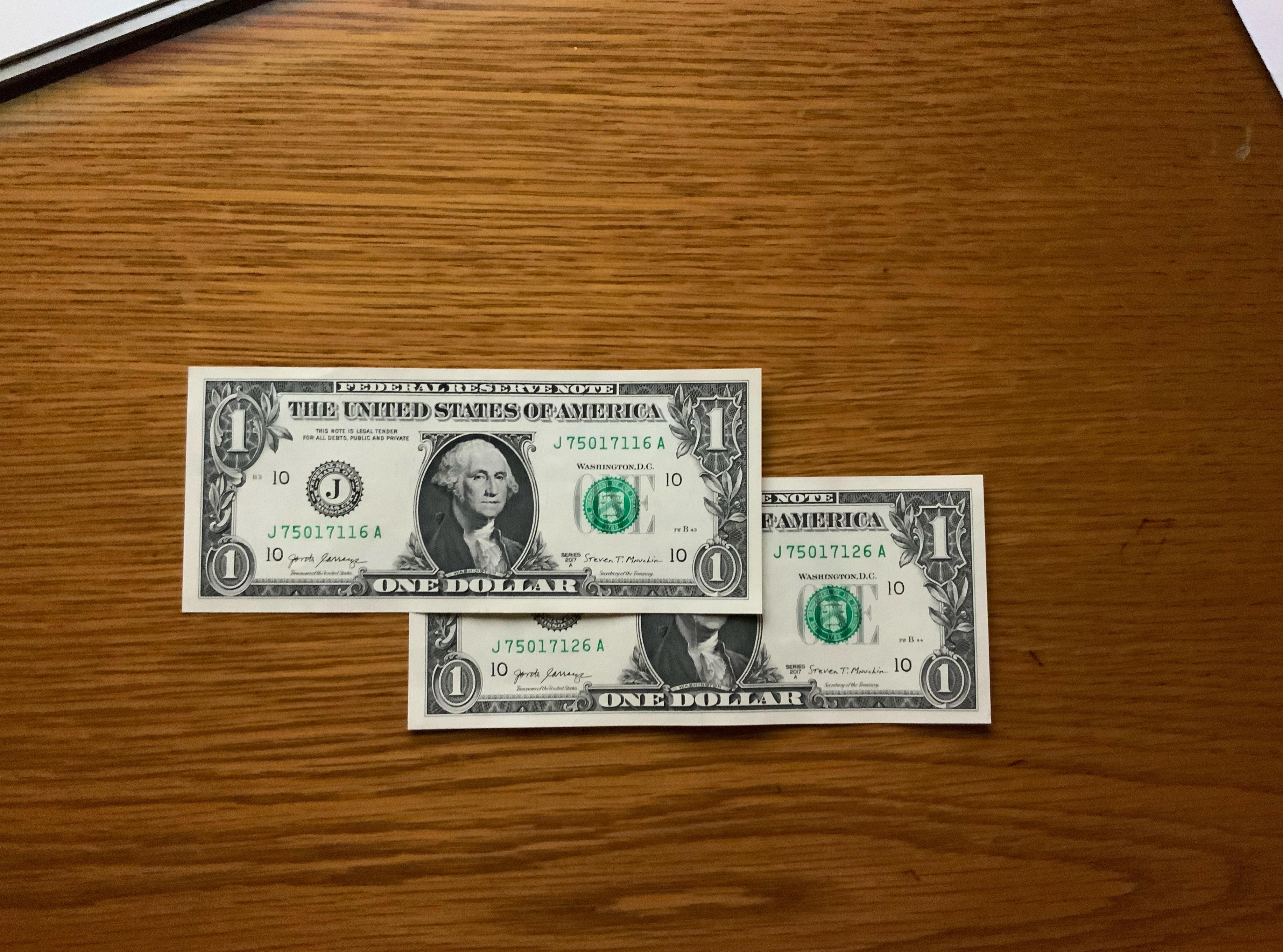 The Serial numbers on these two dollars are only 1 digit off | Scrolller