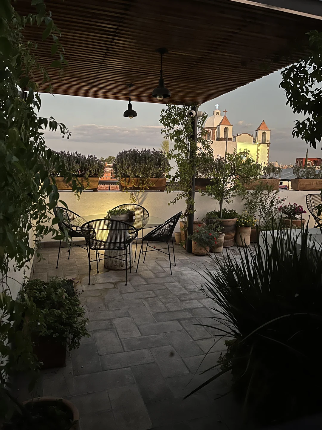 It’s outside, but our rooftop patio looks really cozy in the morning light | Scrolller