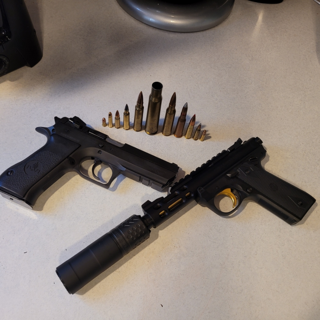 My first pistol and my newest pistol, 11 years apart. | Scrolller