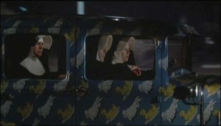 Michael Keaton and Marilu Henner in Johnny Dangerously 1984 | Scrolller