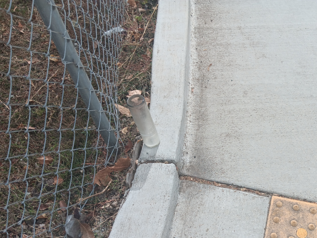 Candle left on sidewalk | Scrolller