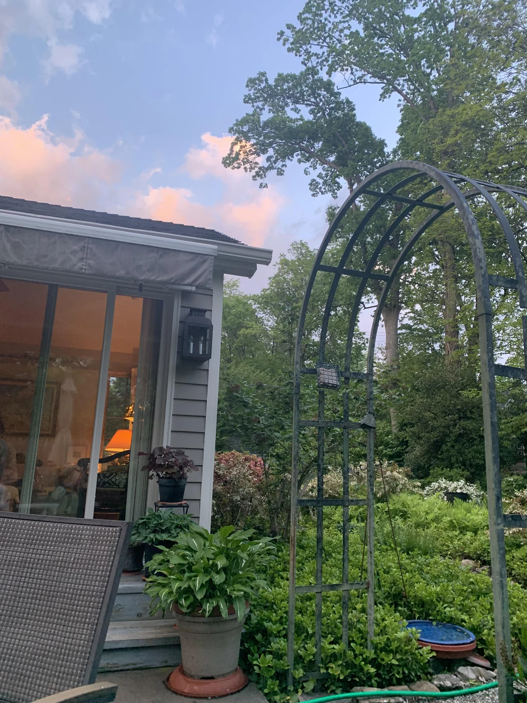 The view from my mother’s patio into her sunroom and garden. | Scrolller