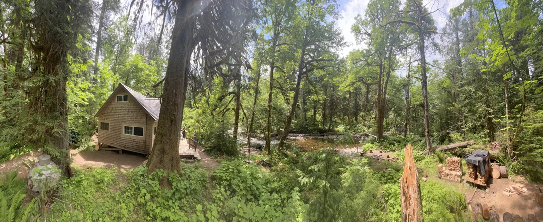 Panorama shot. PNW cabin | Scrolller
