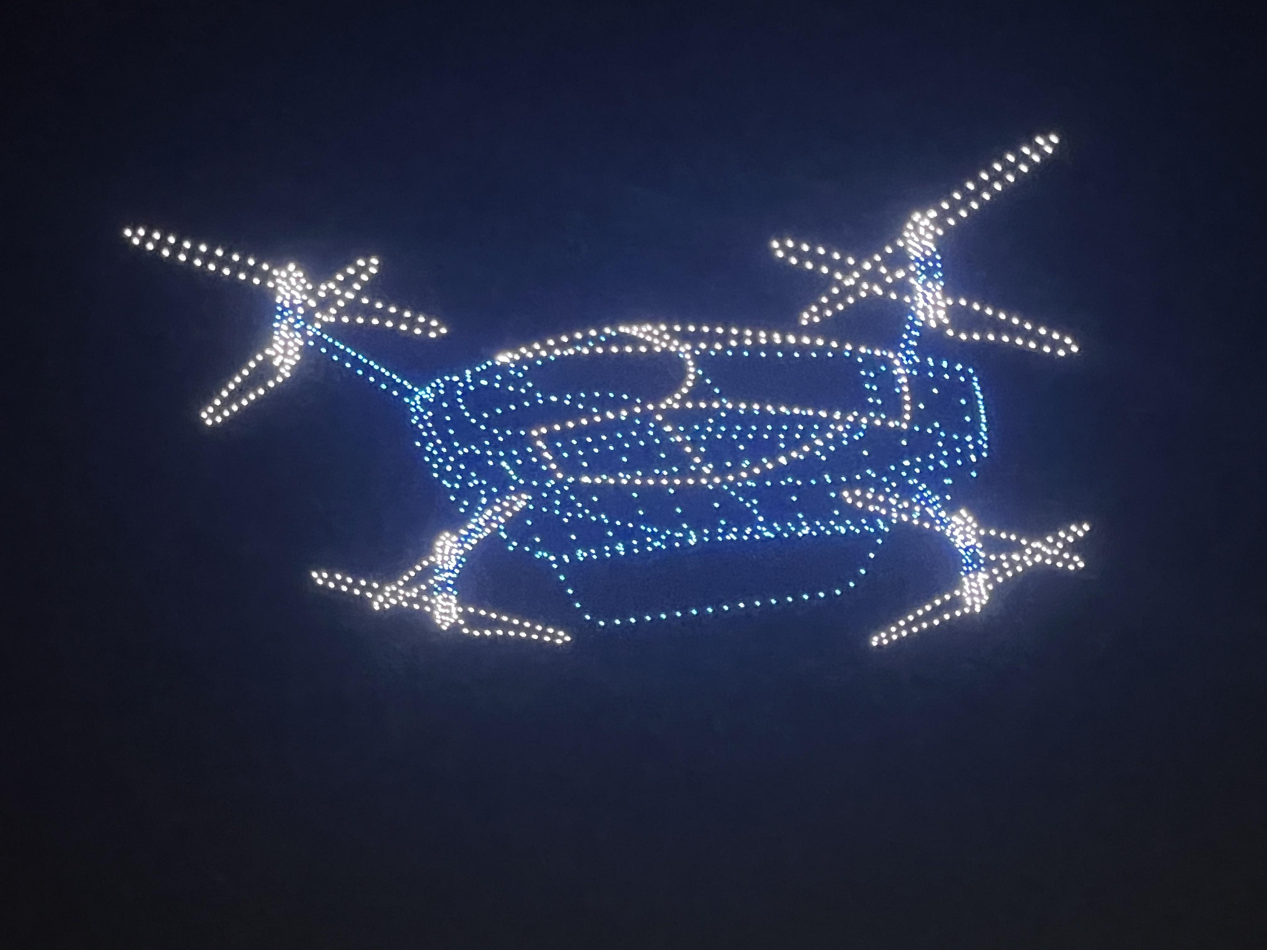 Drones making up the image of a drone | Scrolller