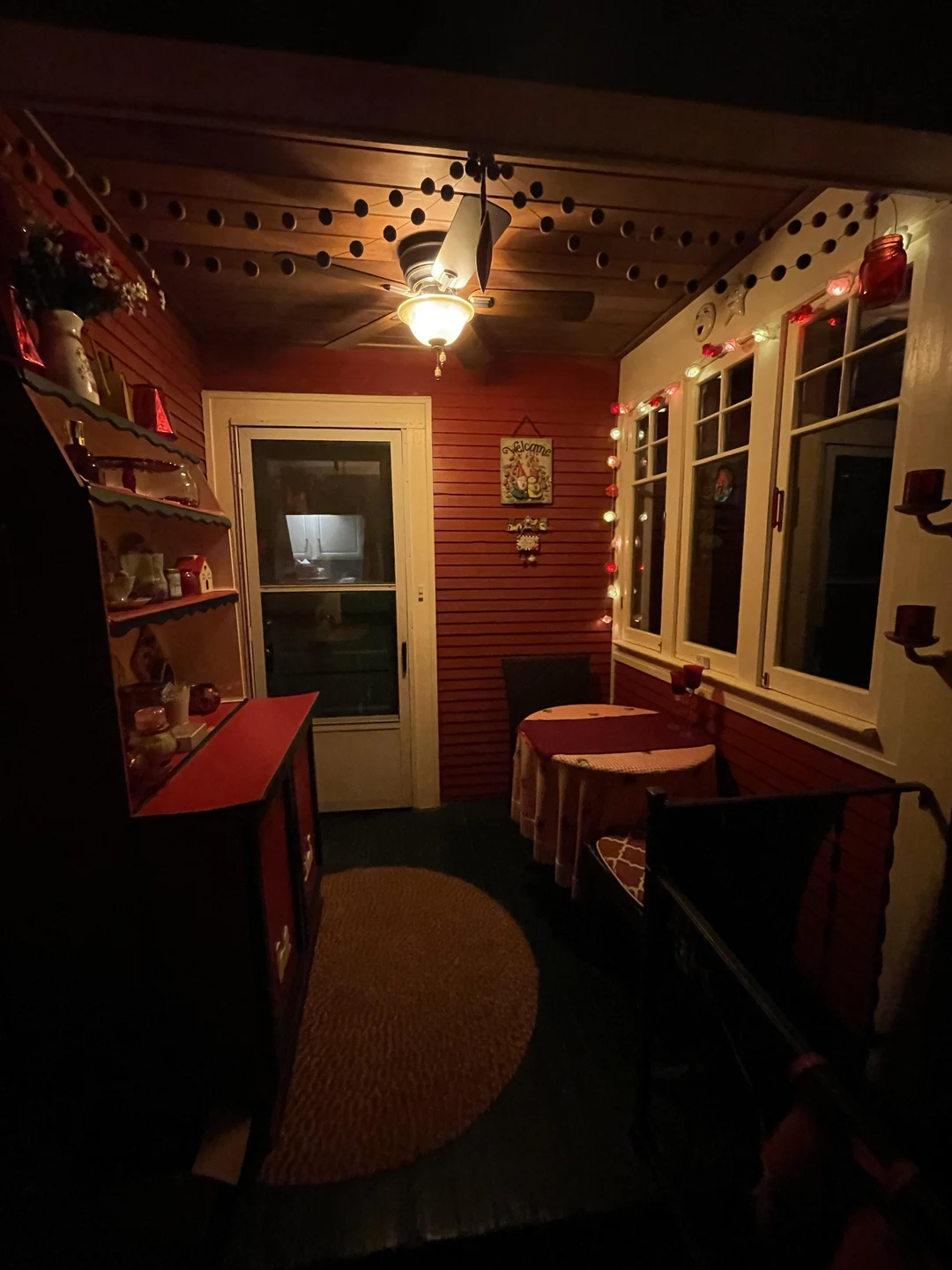 Partially enclosed back porch dining area (original content) | Scrolller