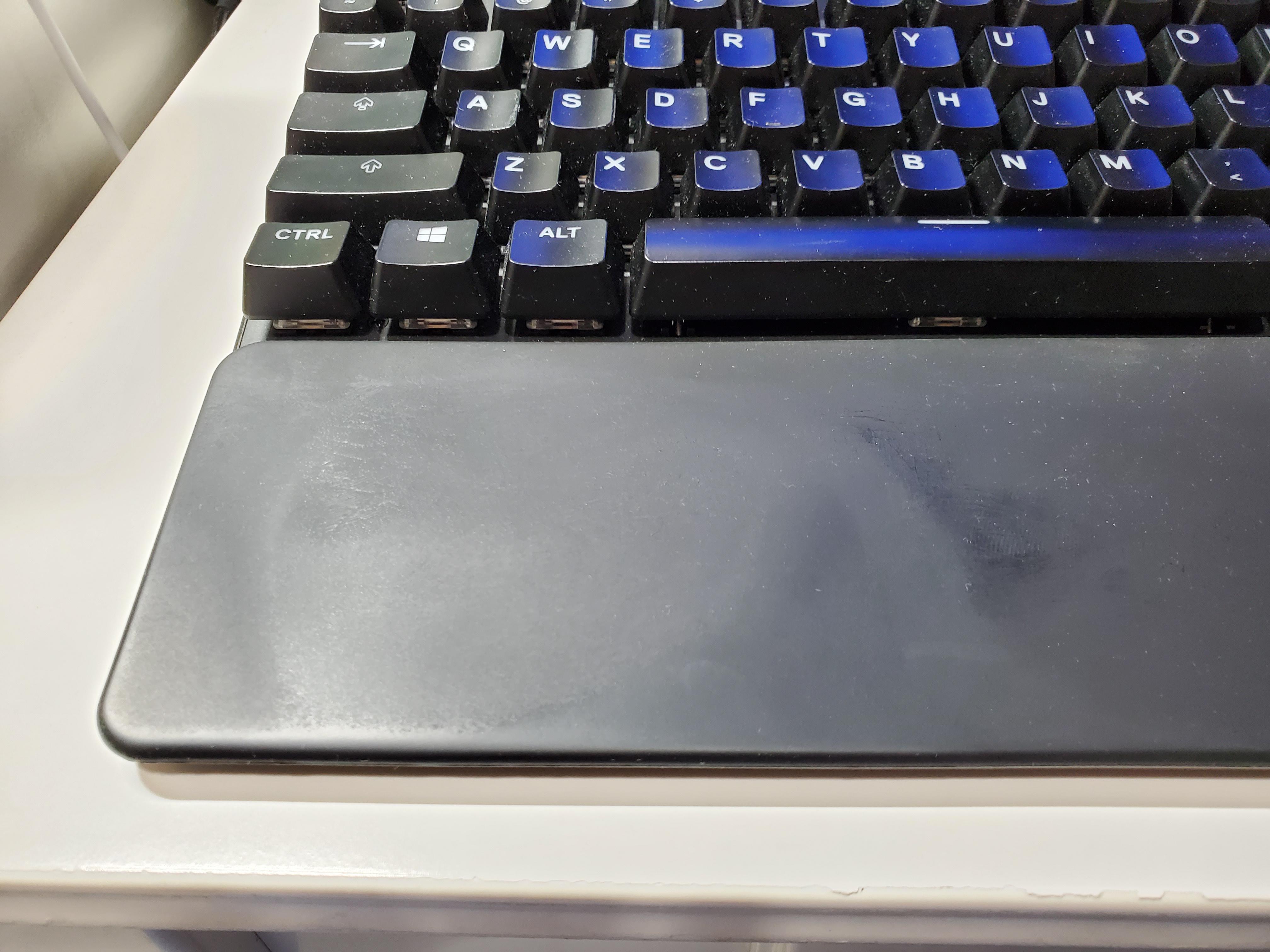 How can I clean the wrist rest and the oily keys? | Scrolller