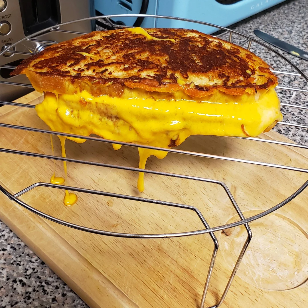 My wife asked for a grilled cheese, all we had was cheddar. | Scrolller