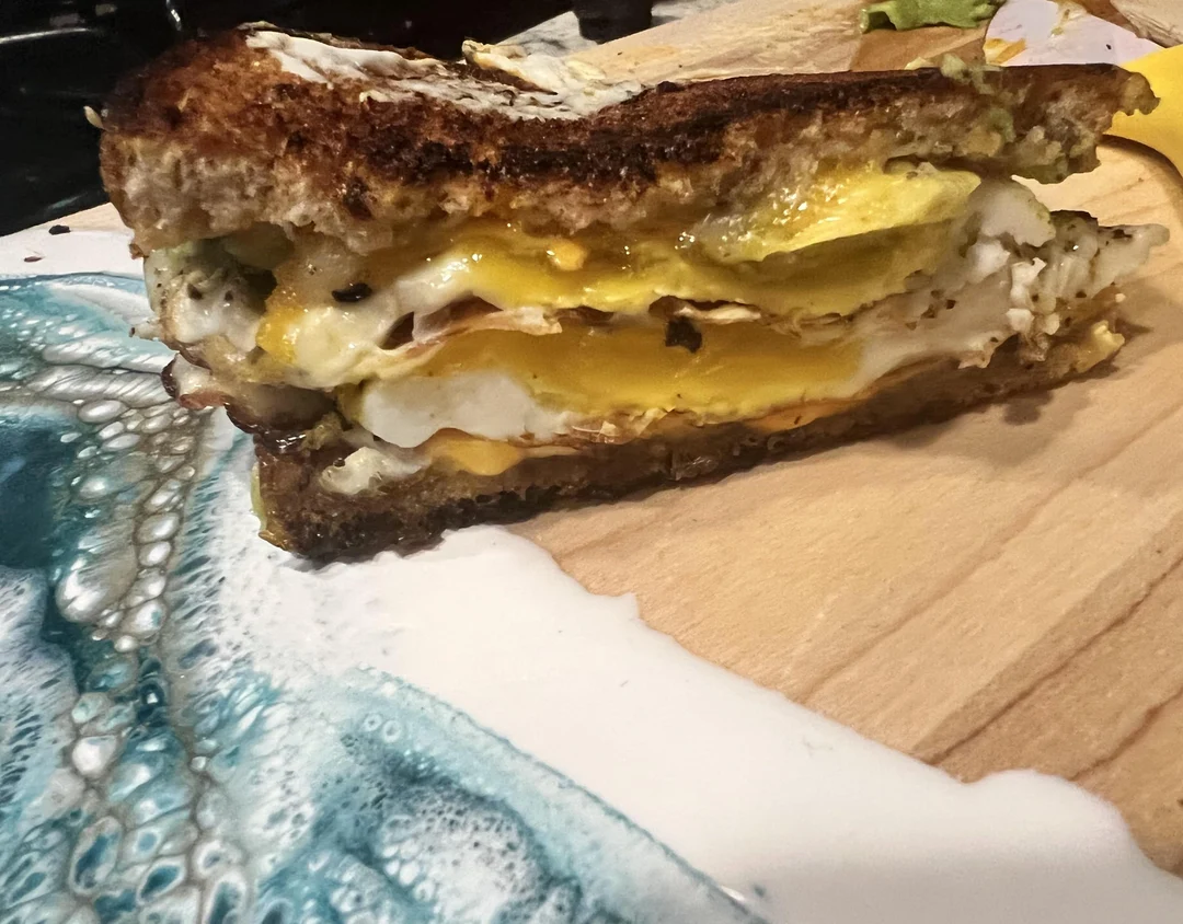 Not the best pic but: Egg, smashed avocado, colby/pepper jack cheese, Sir Kensington’s chipotle ...