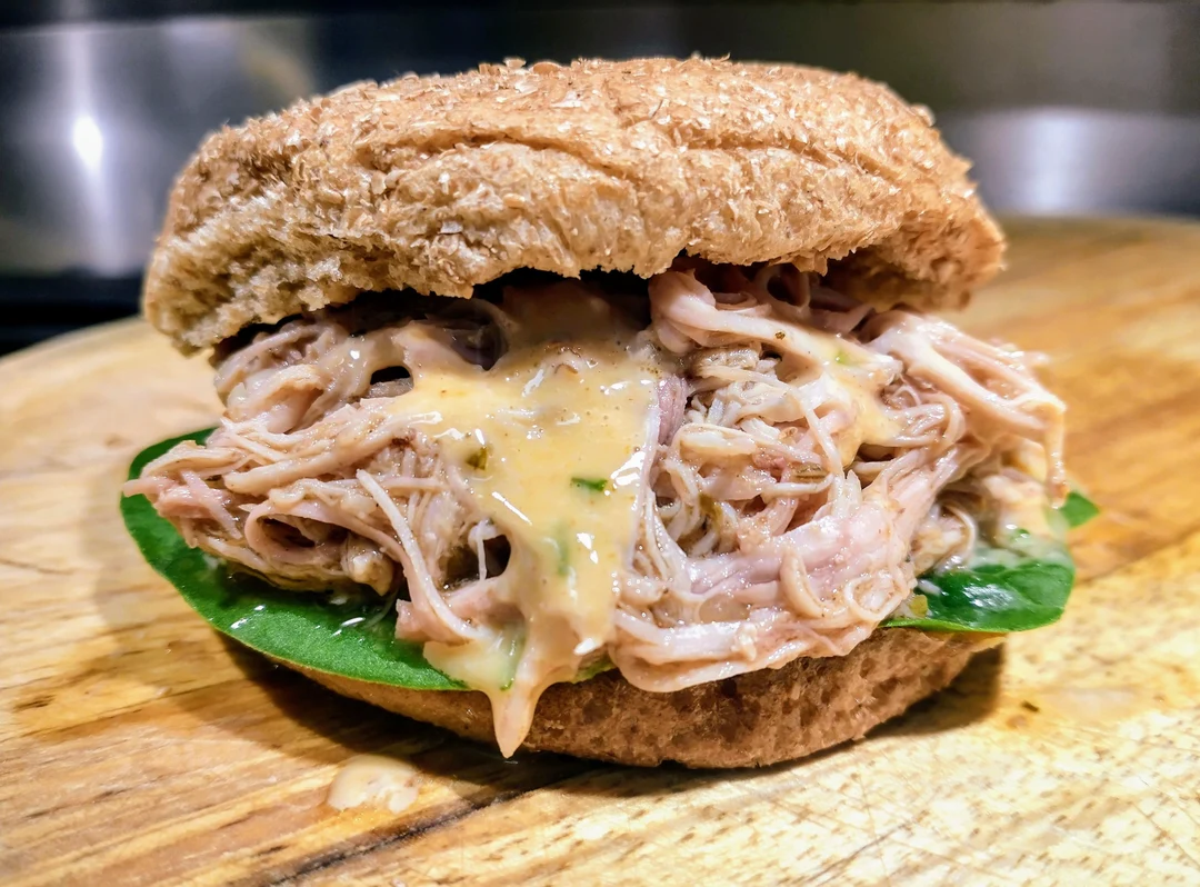 Homemade Pulled Chicken with Spicy BBQ Remoulade Sauce and Spinach on Whole Wheat Bun. | Scrolller