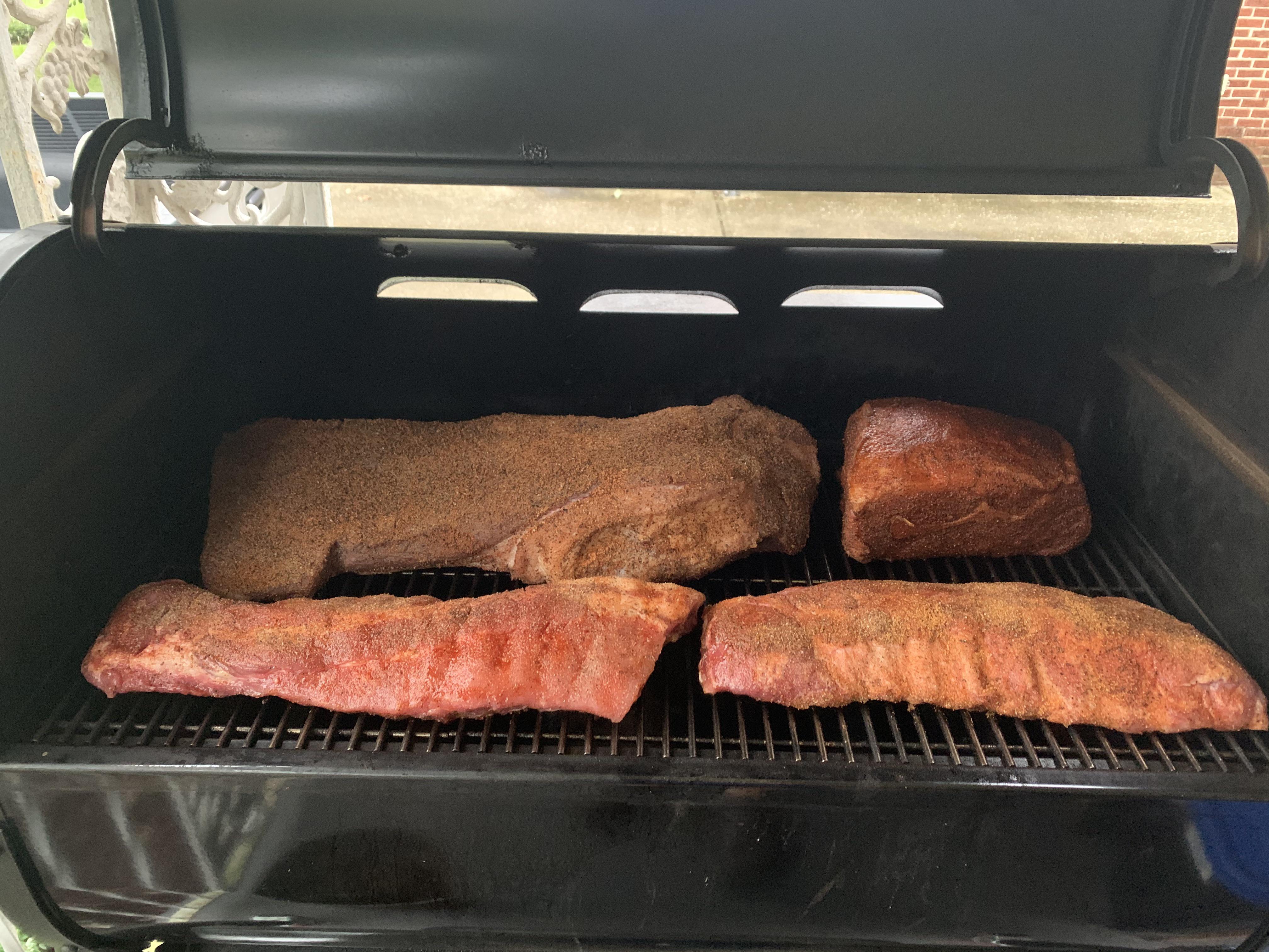 First brisket! 15 lb full packer. 9 lb pork butt. 2 racks of baby backs ...
