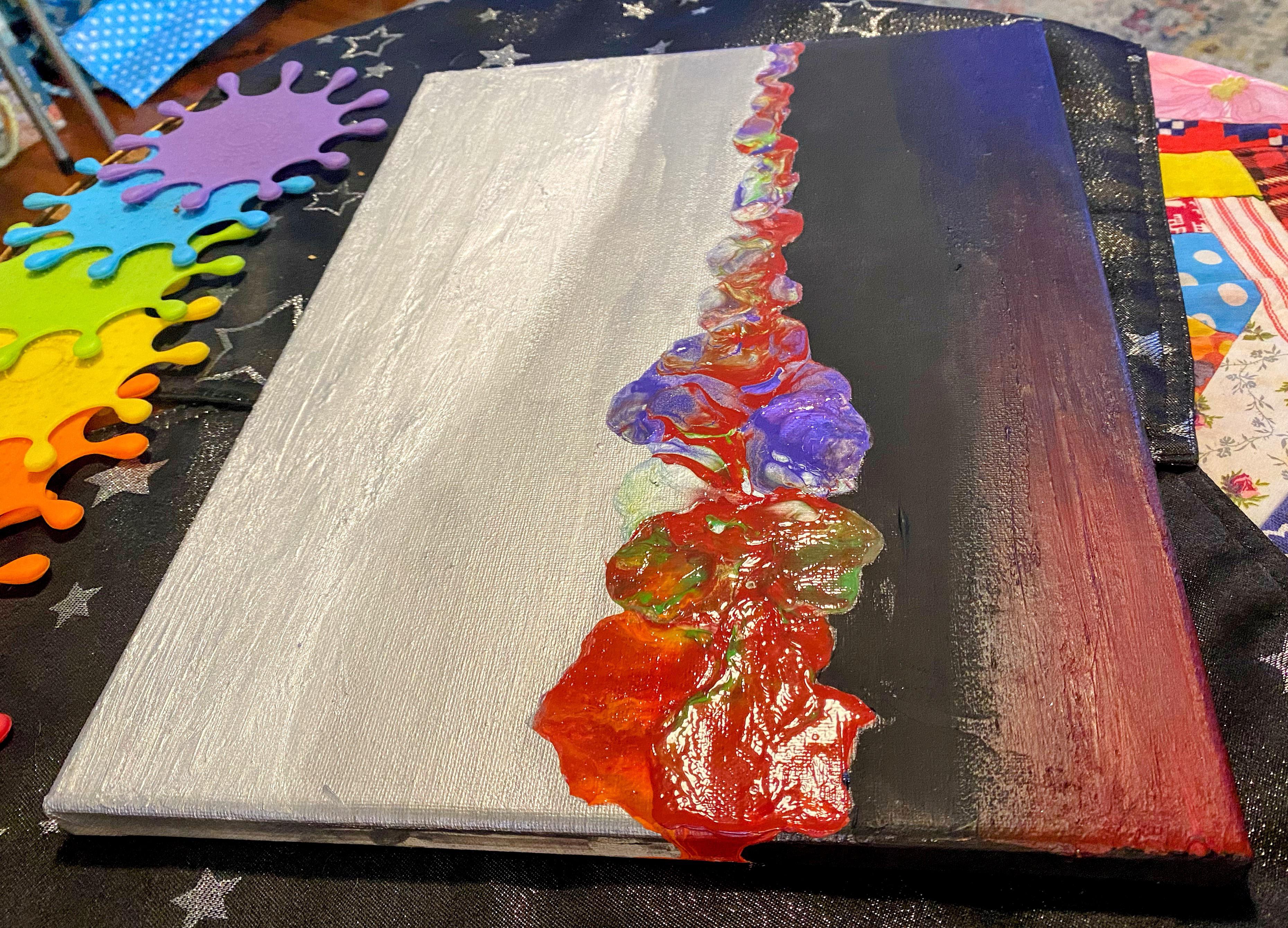 I tried something different... and did a controlled pour. Then put a glaze over it and it's ...