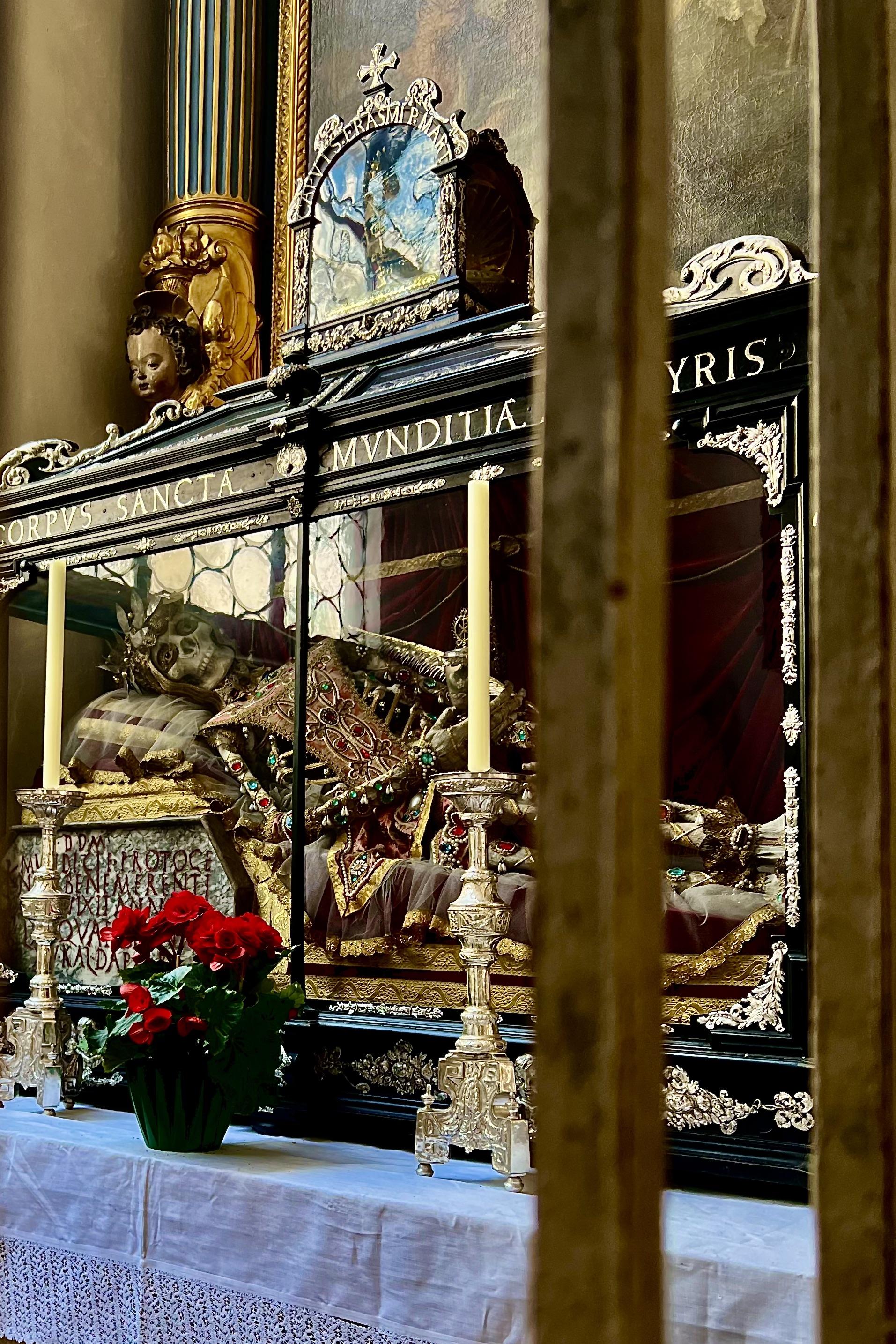 Saint Munditia’s skeletal remains bejeweled and on display in St. Peter's Church in Munich ...