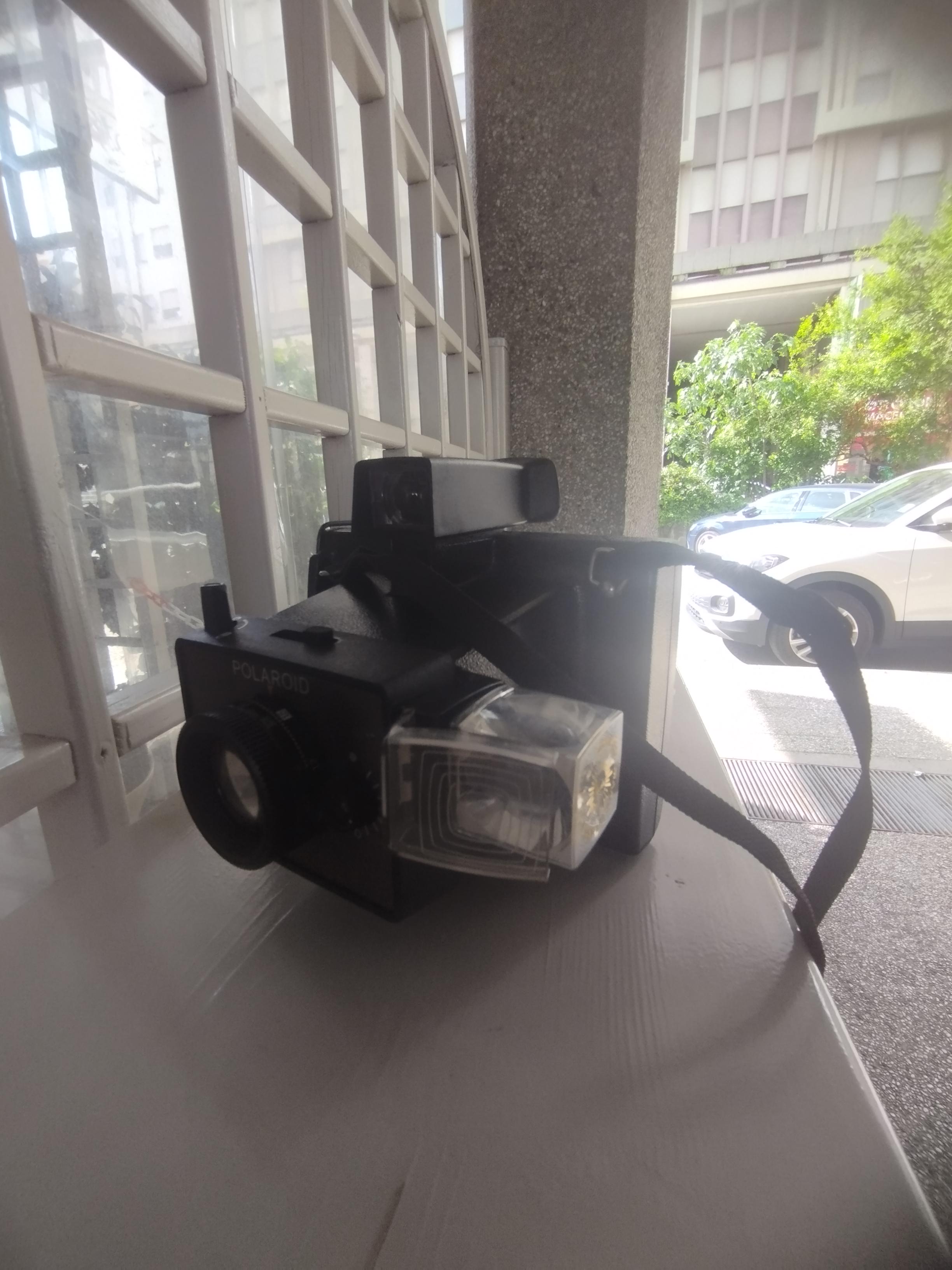 Help me identifying this polaroid | Scrolller