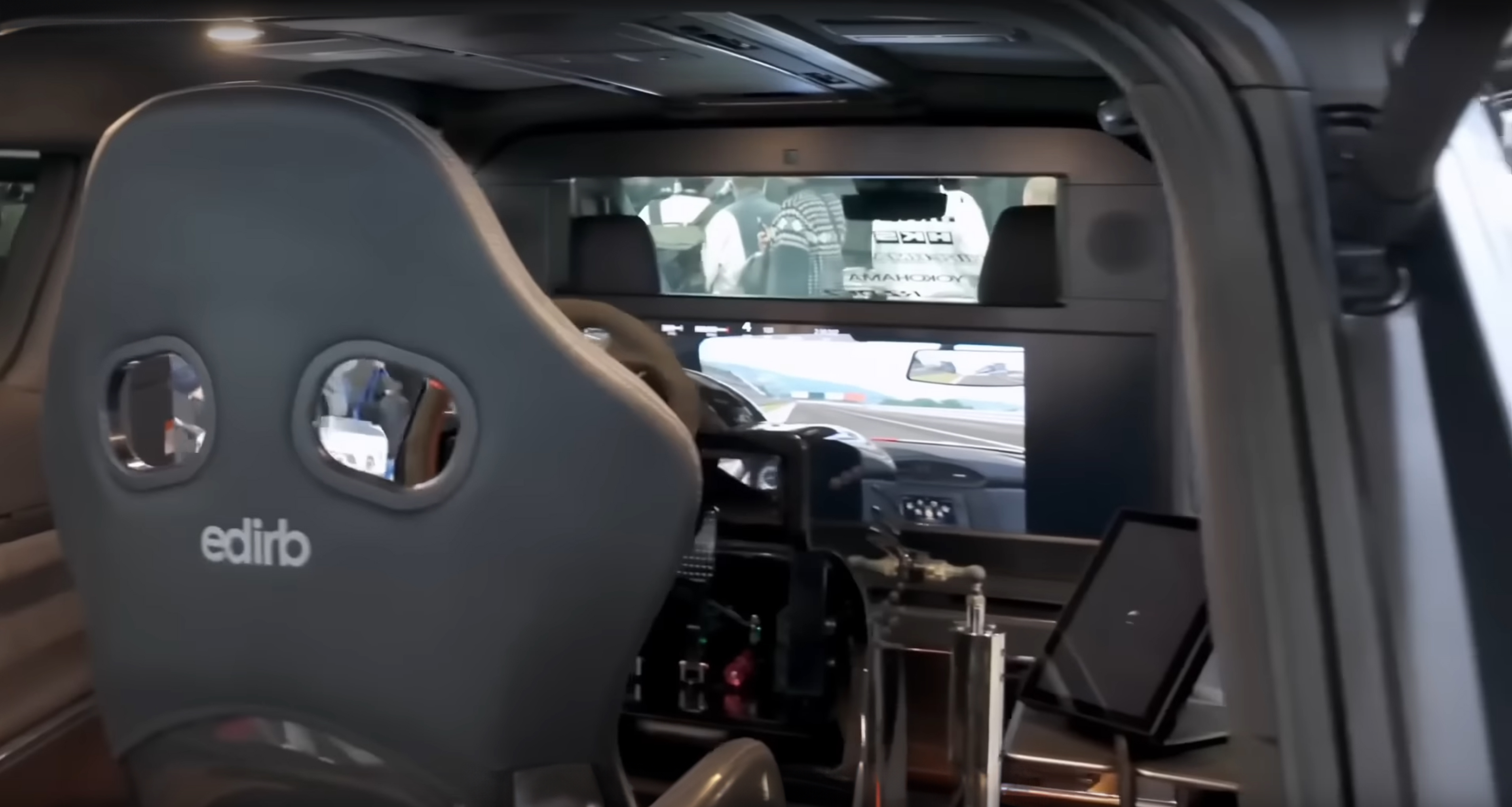 Only in Japan, racing sim inside a Lexus LM. Boss goes simracing while riding to work. | Scrolller