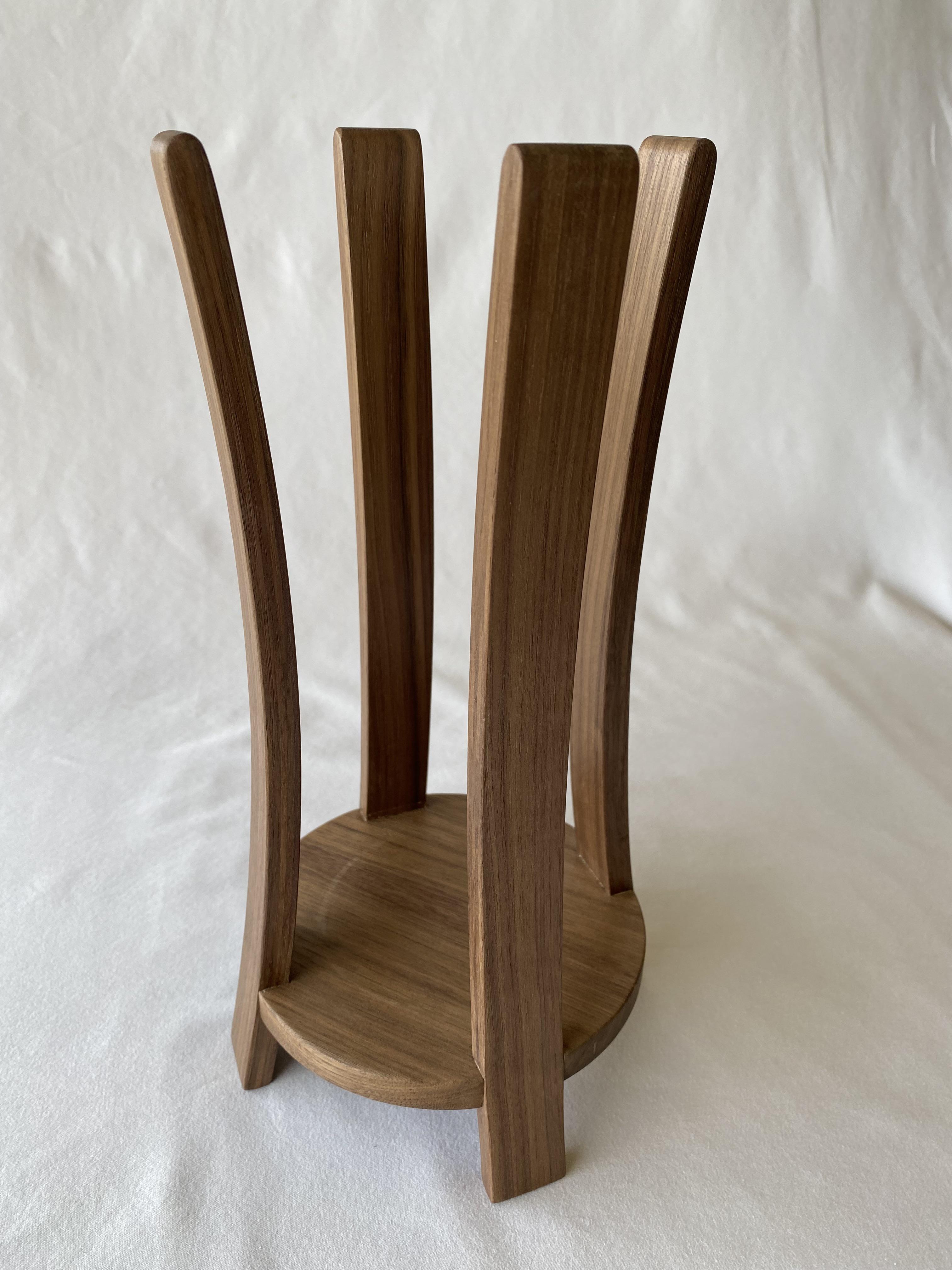 Made a stand for a vase with bent lamination. | Scrolller