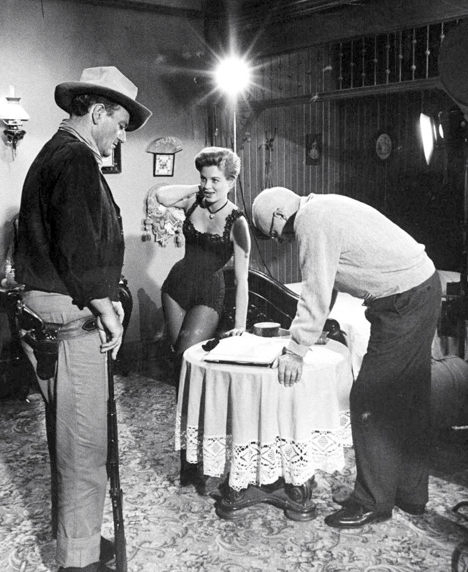 John Wayne, Angie Dickinson & Howard Hawks, filming 'Rio Bravo' | Scrolller