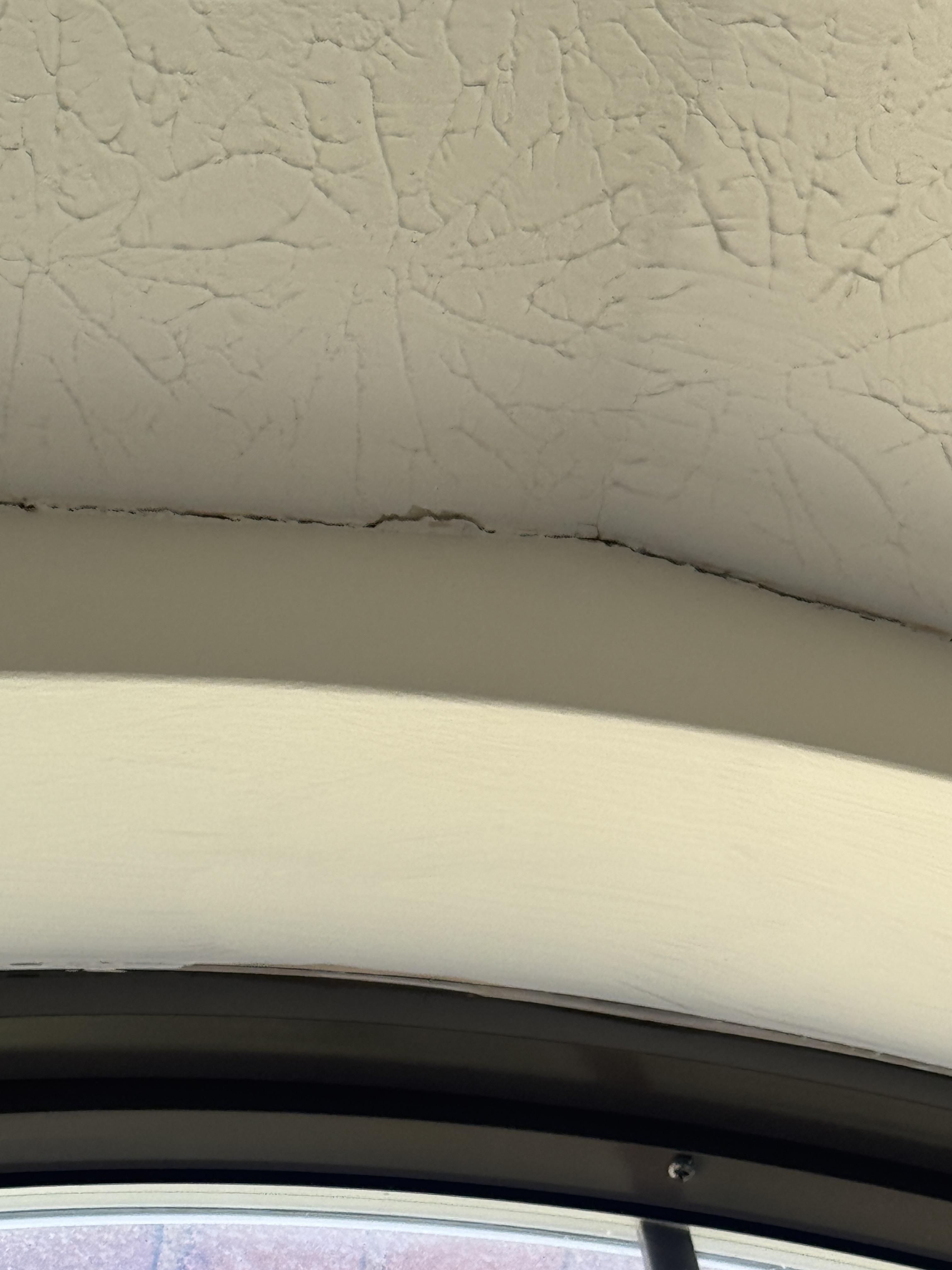 How do I fix these cracks between the wall and ceiling? | Scrolller