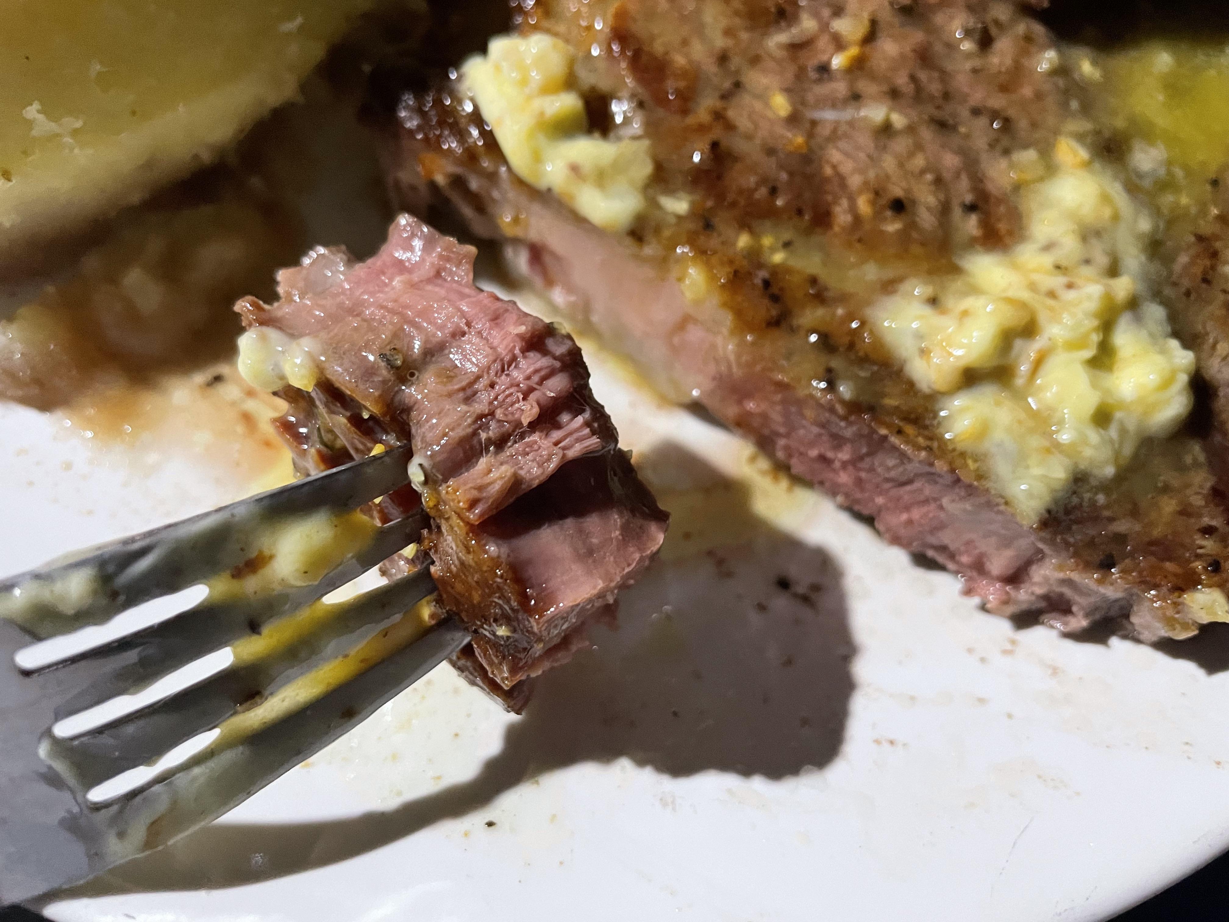 [homemade] Coal-grilled ribeye, topped with garlic and thyme butter, sautéed asparagus, and ...