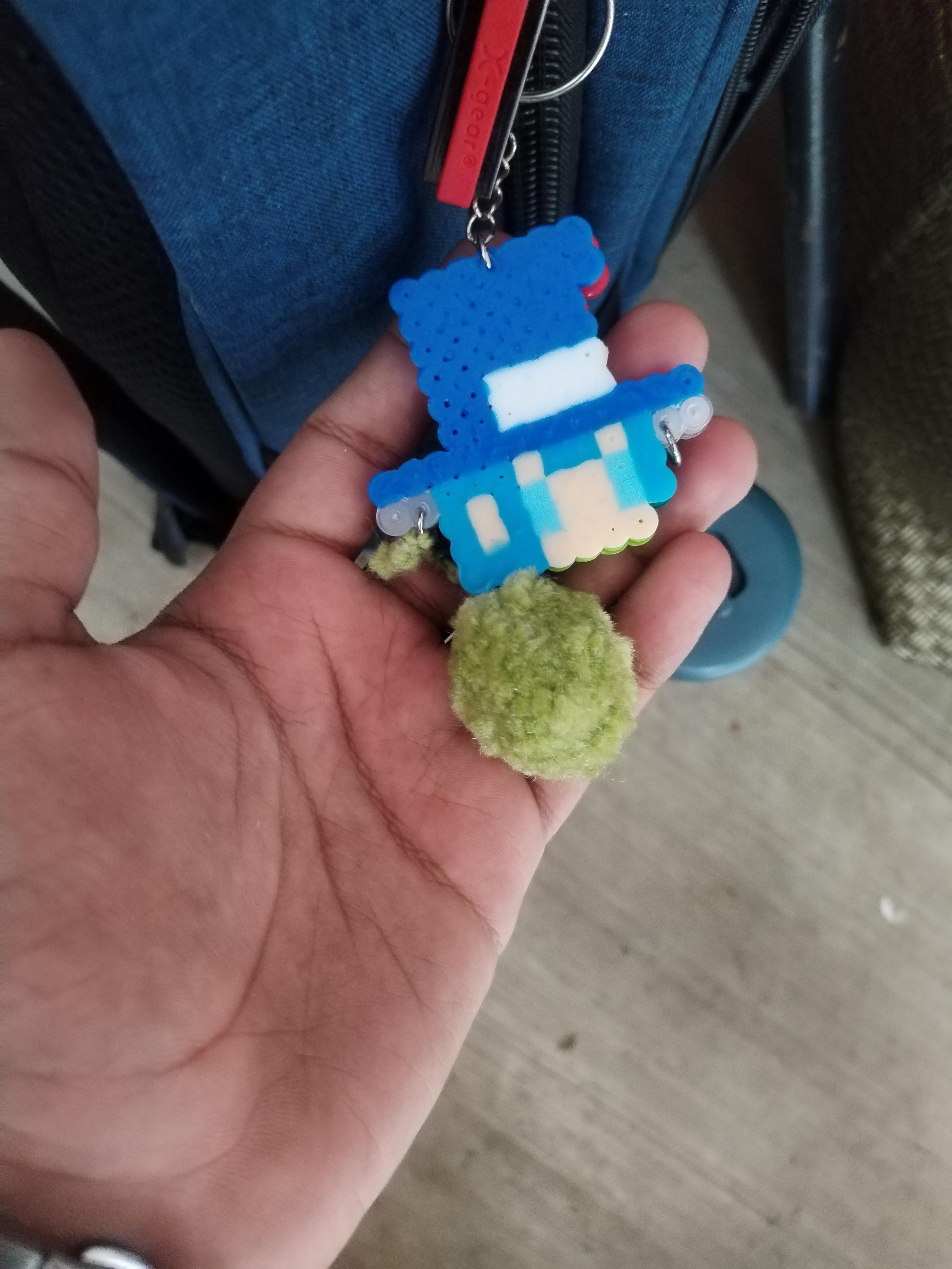 A friend gave me this Peacock Keychain | Scrolller