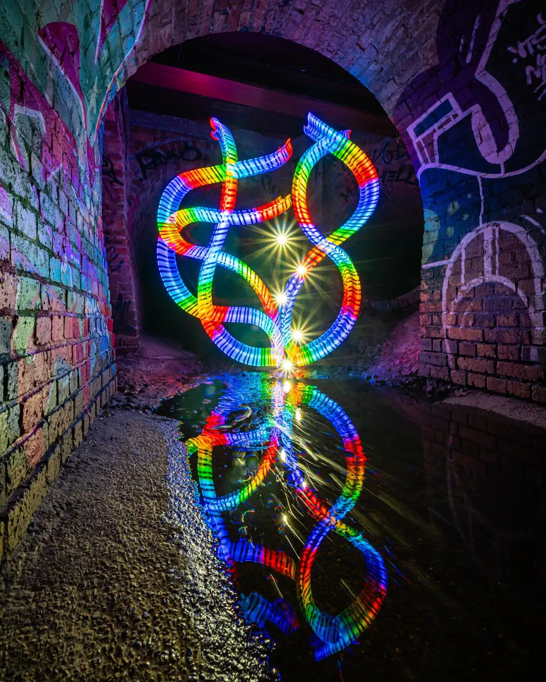 Long exposure light painting in a 100 year old tunnel [OC] [1080x1350 ...