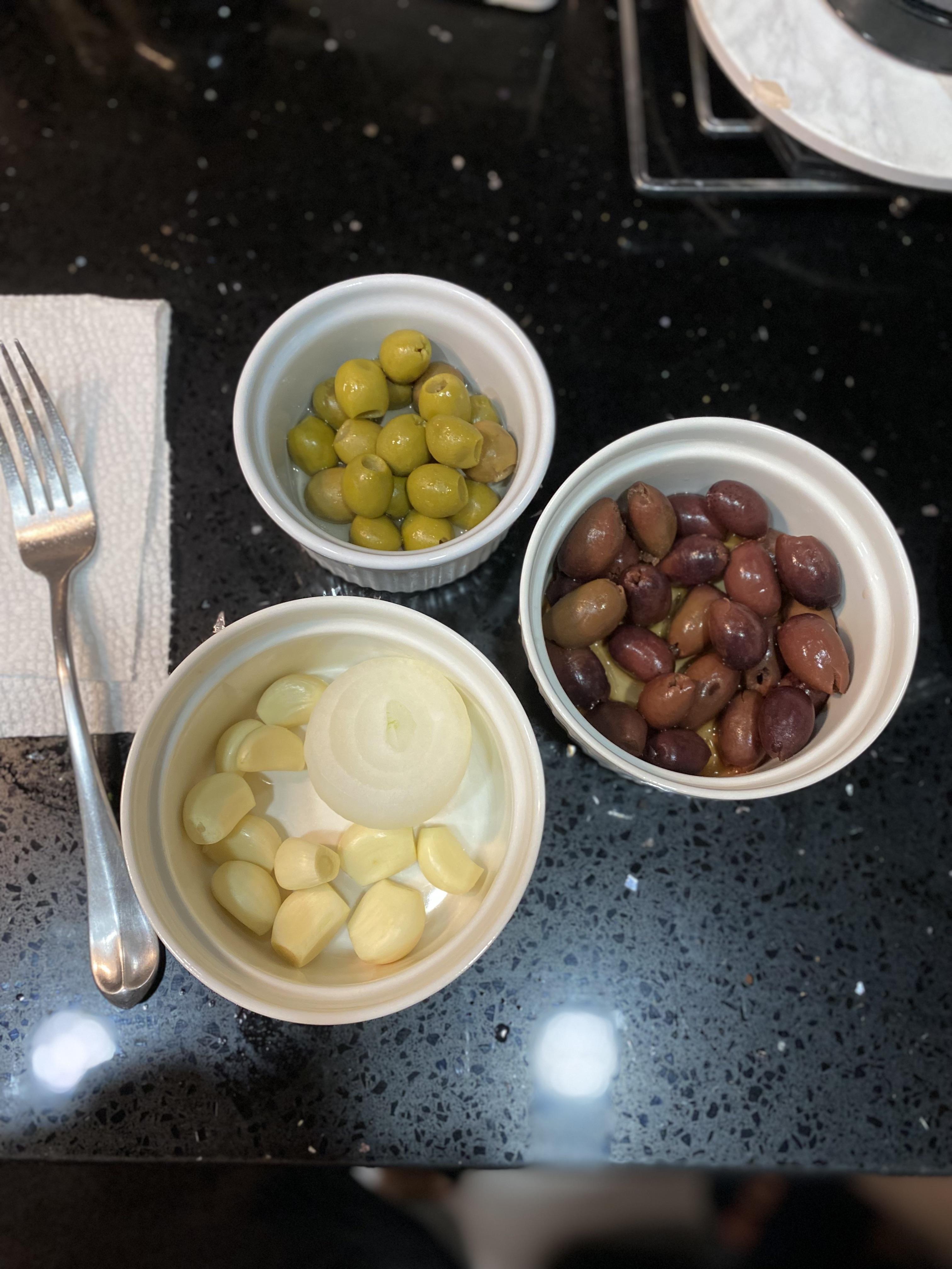 Sardines, bread, pickles, garlic and olives | Scrolller