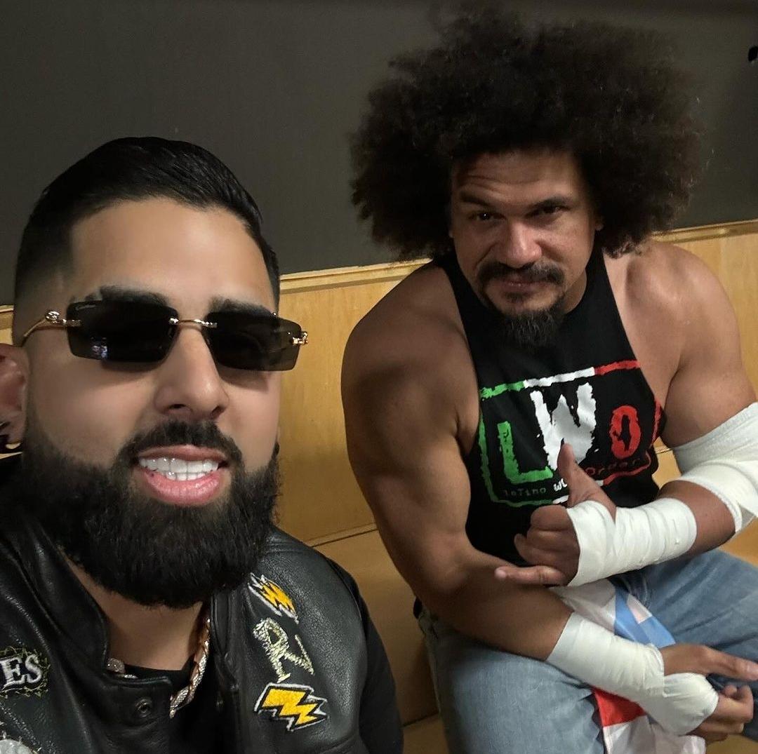 DJ Luian backstage at Smackdown and crossing paths with The Rock, CM Punk and Carlito. | Scrolller