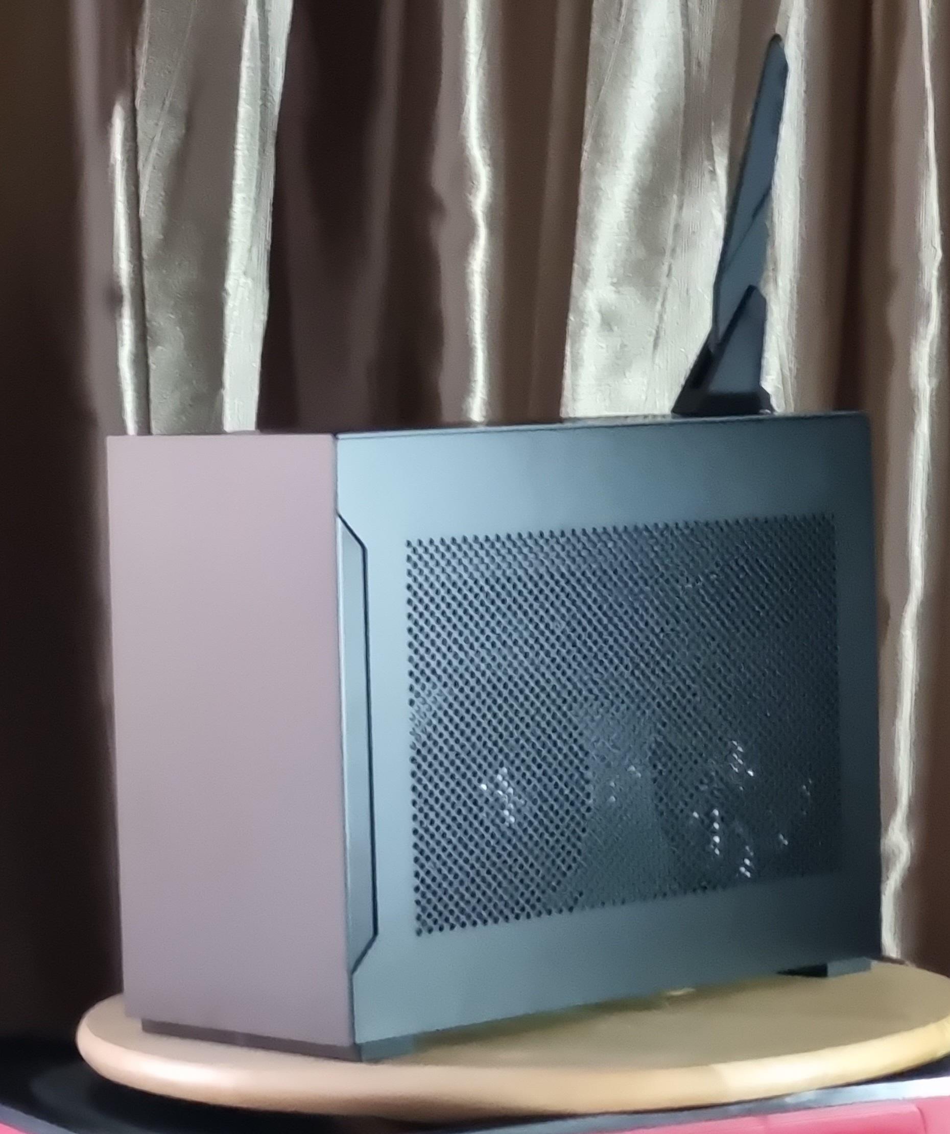 Yet another Lian Li A4 H20 clone in black. | Scrolller