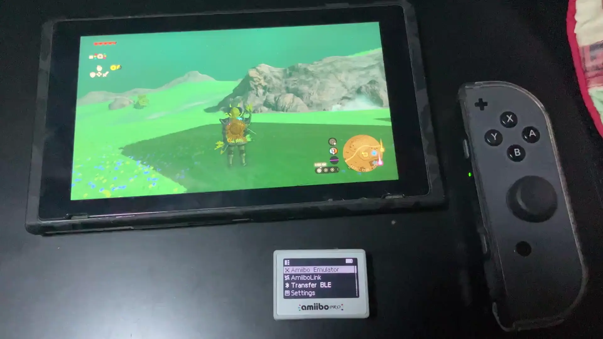 New version of Amiibolink (Pixl js) with OLED screen, storage, and rechargeable by USB-C | Scrolller