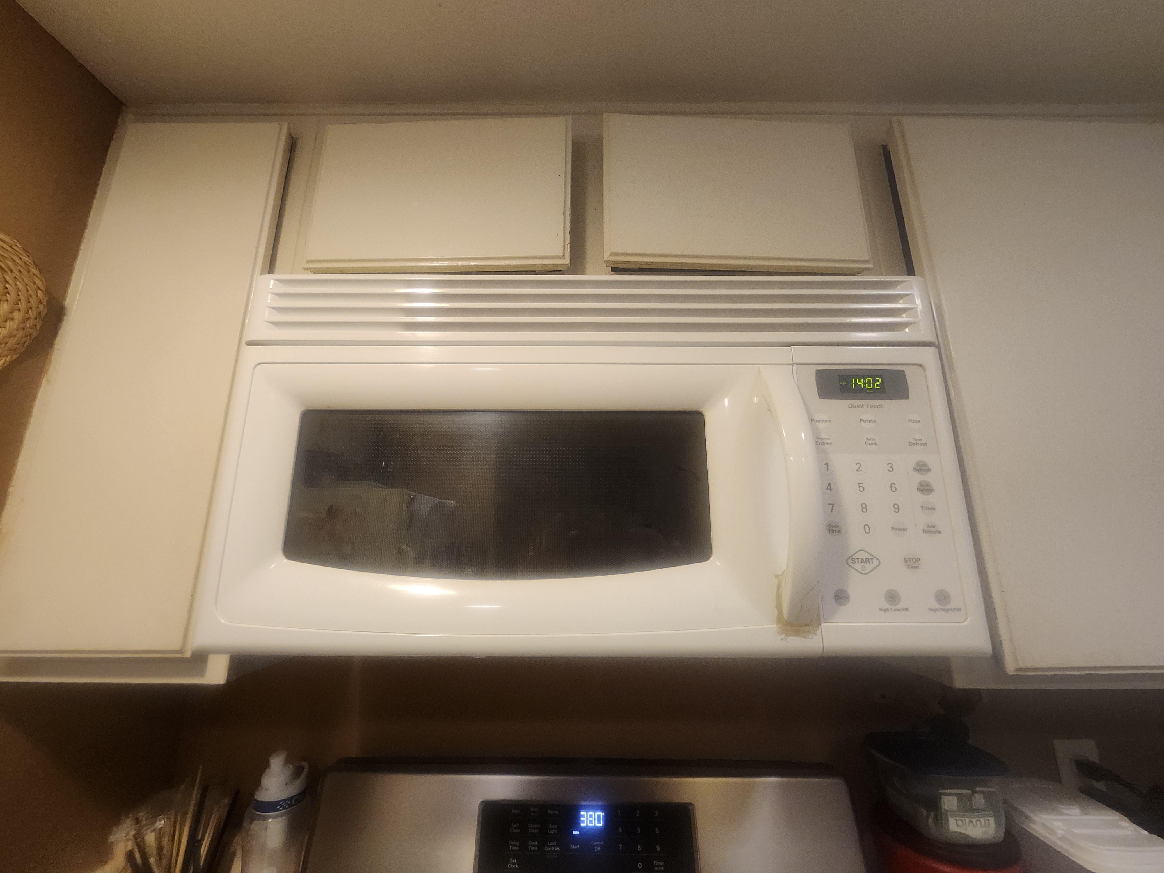 Microwave (wall mounted) removal | Scrolller