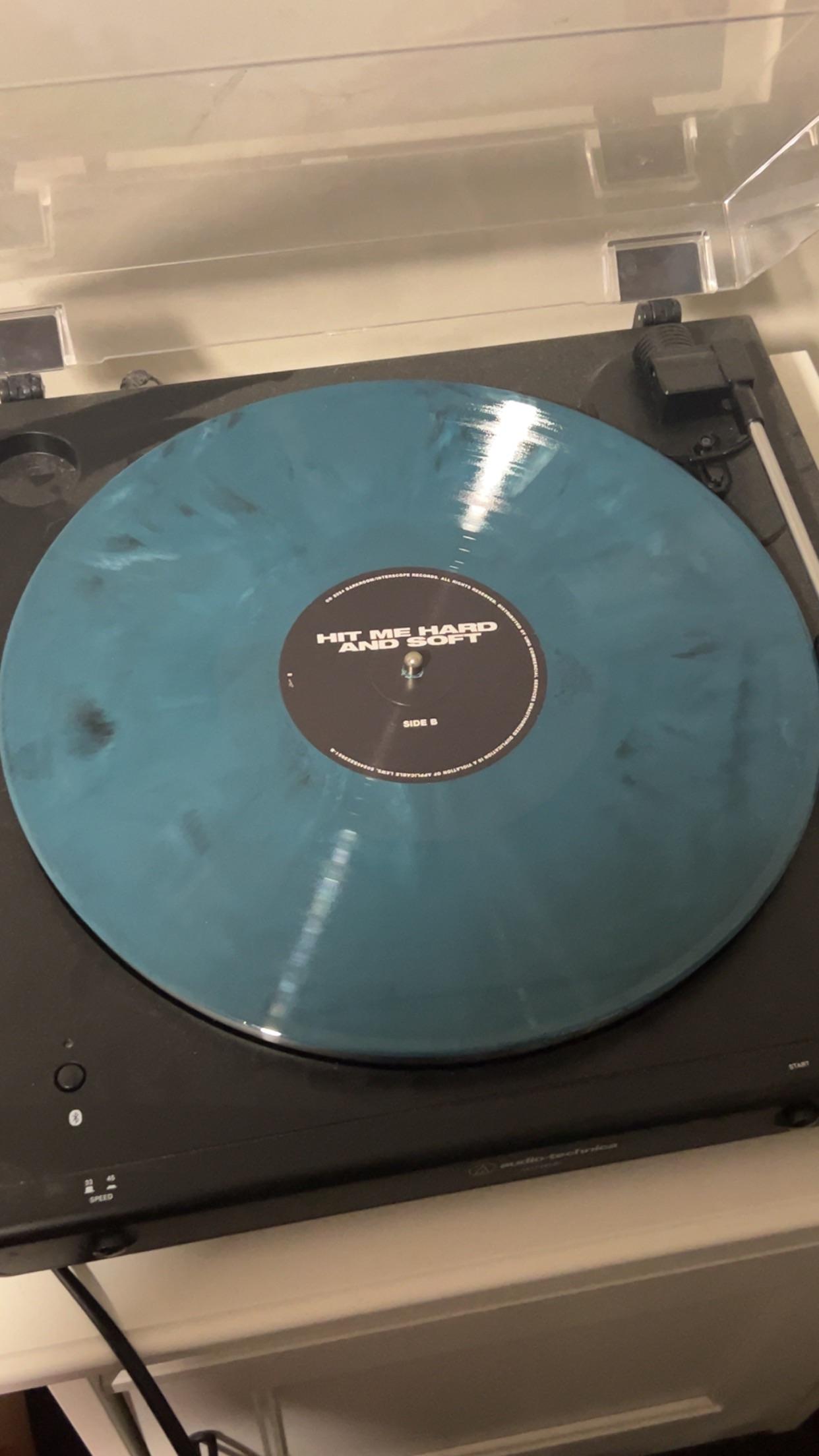 Blue vinyl pressing | Scrolller