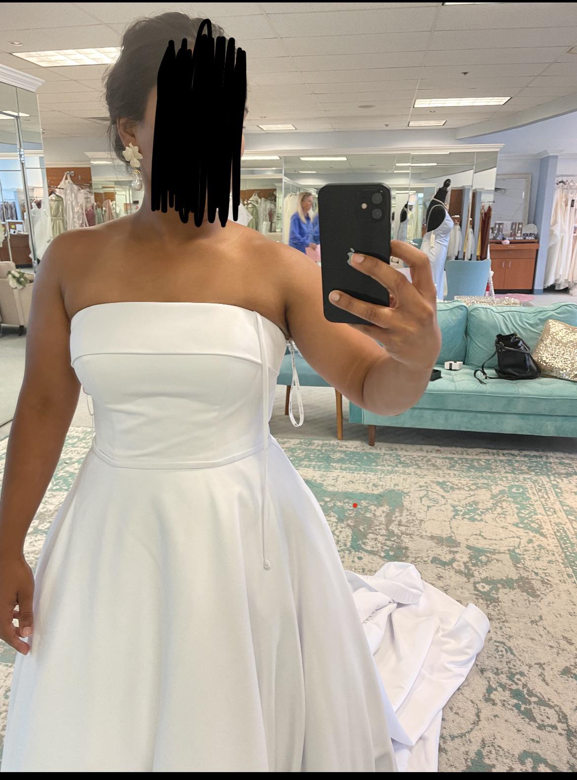 Are my earrings too big for my wedding dress? I wanted bigger earrings b/c my dress is so simple ...
