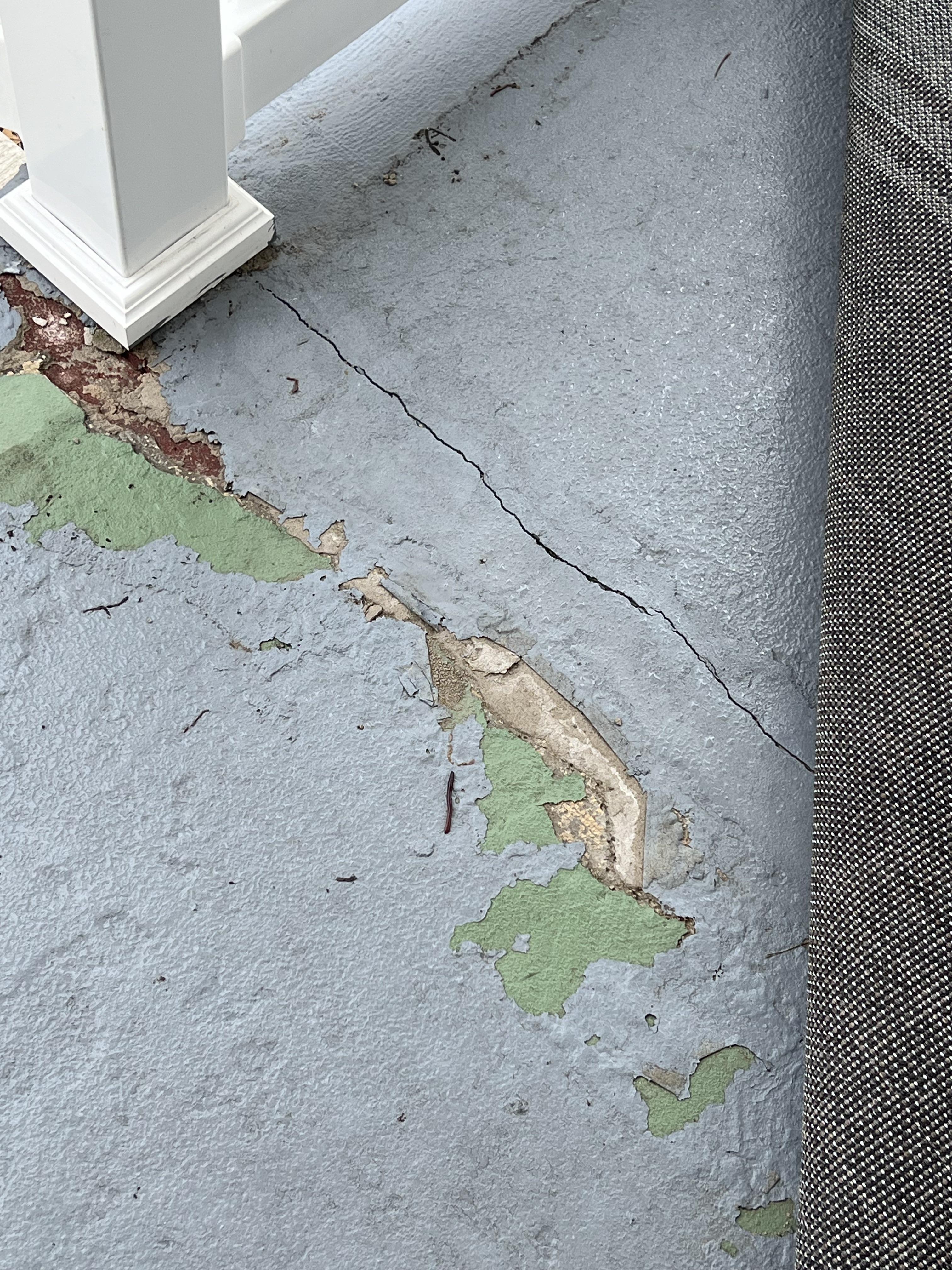 Front porch cracked. | Scrolller