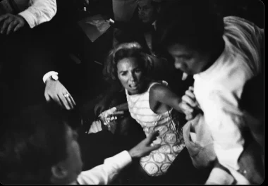 Robert F. Kennedy's wife, Ethel, attempts to comfort him as lay mortally wounded on floor of the ...