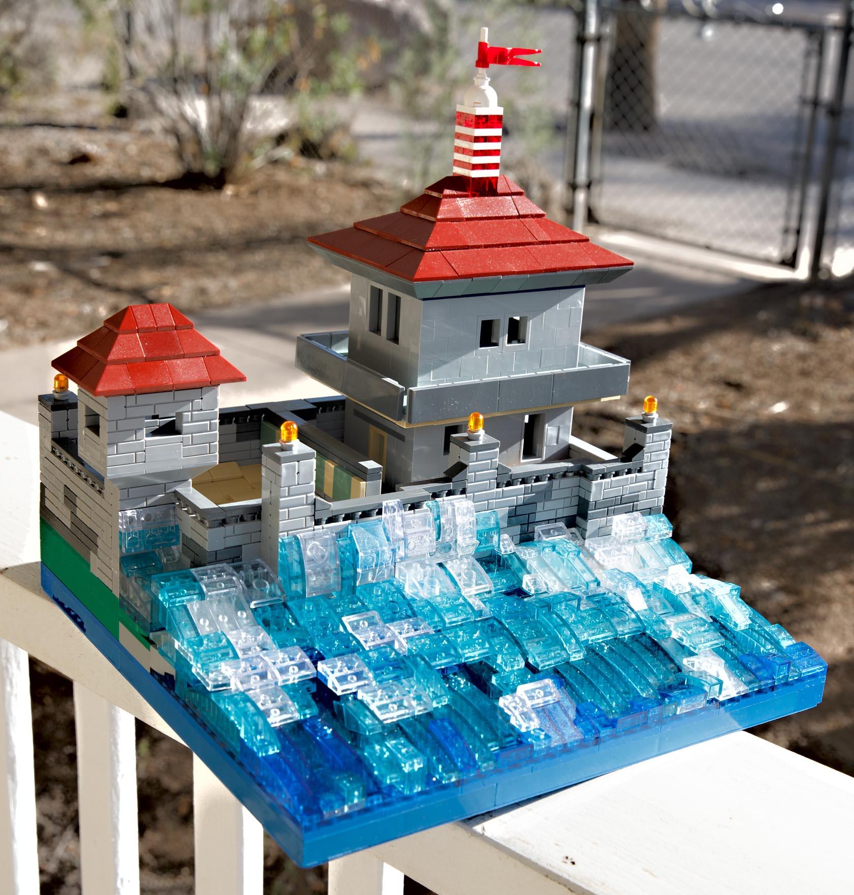 The sun breaks thru the storm as waves lash the north Maine coast. | Scrolller