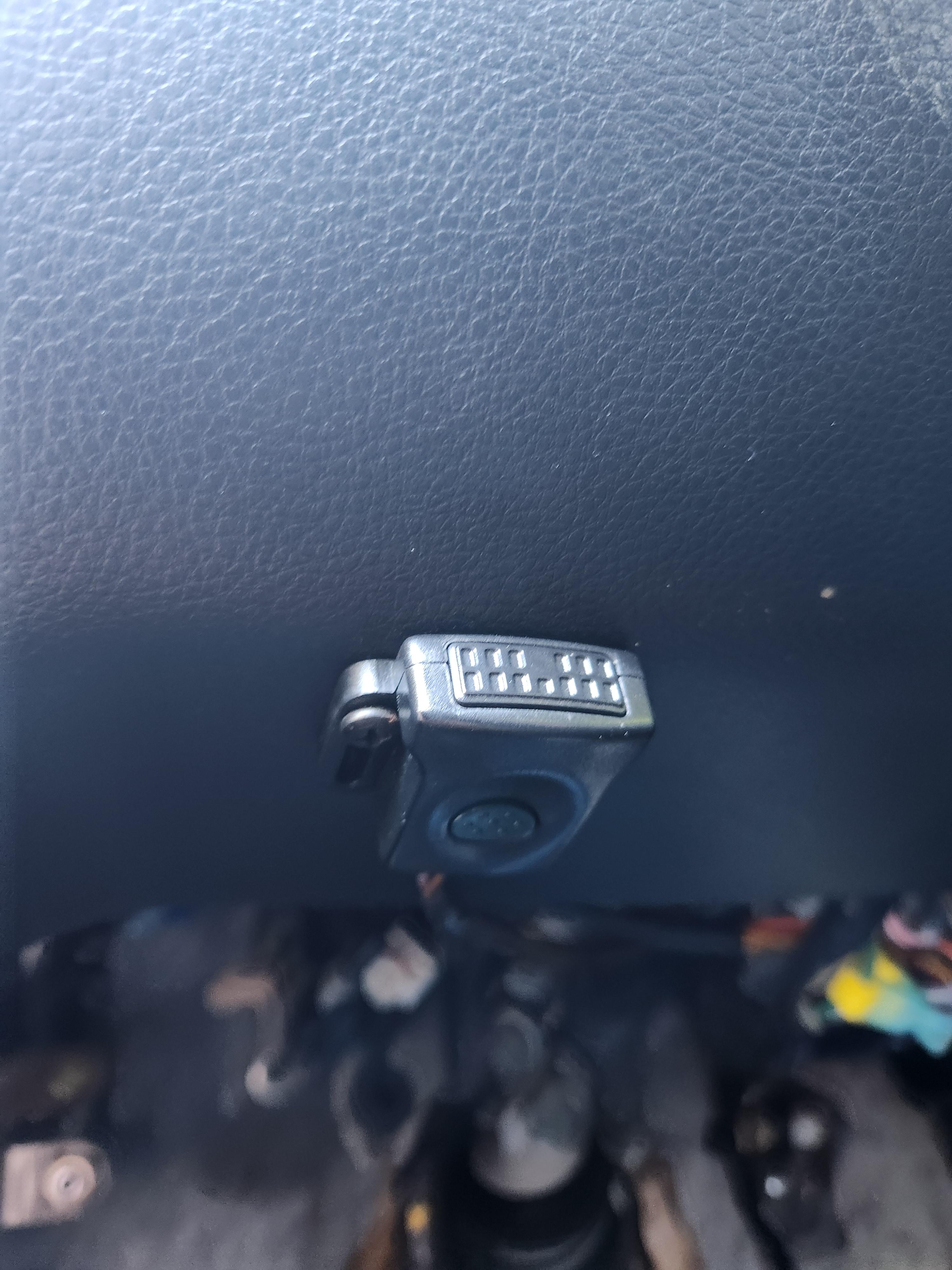 Aftermarket button below steering column | Scrolller