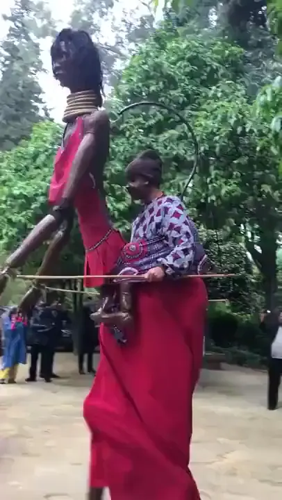 These African puppets controlled by the puppeteer on stilts. | Scrolller