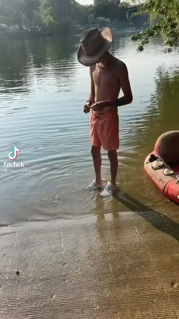 Throwing a Firecracker into a River | Scrolller