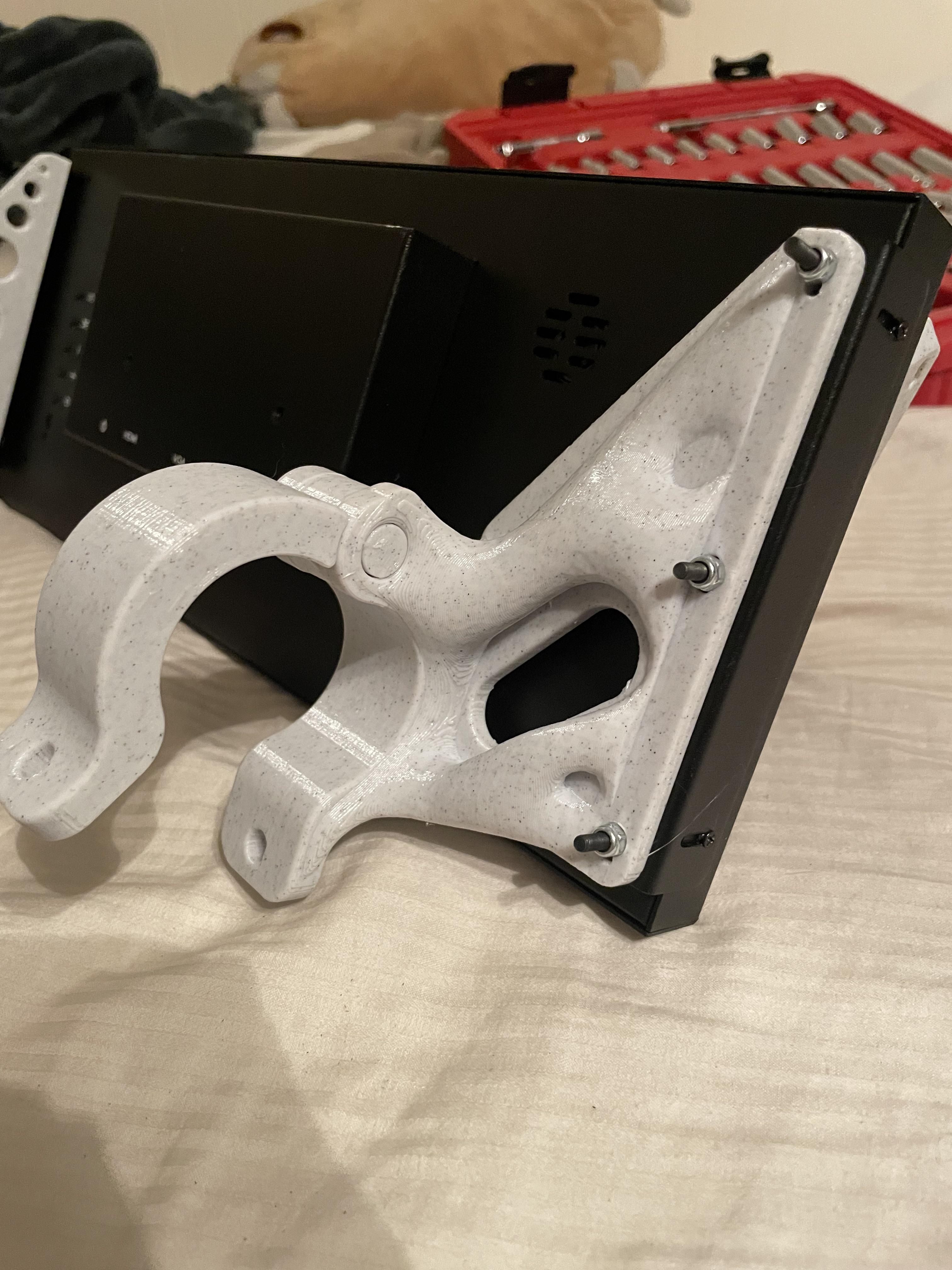Topology optimized gauge screen mount for racecar | Scrolller