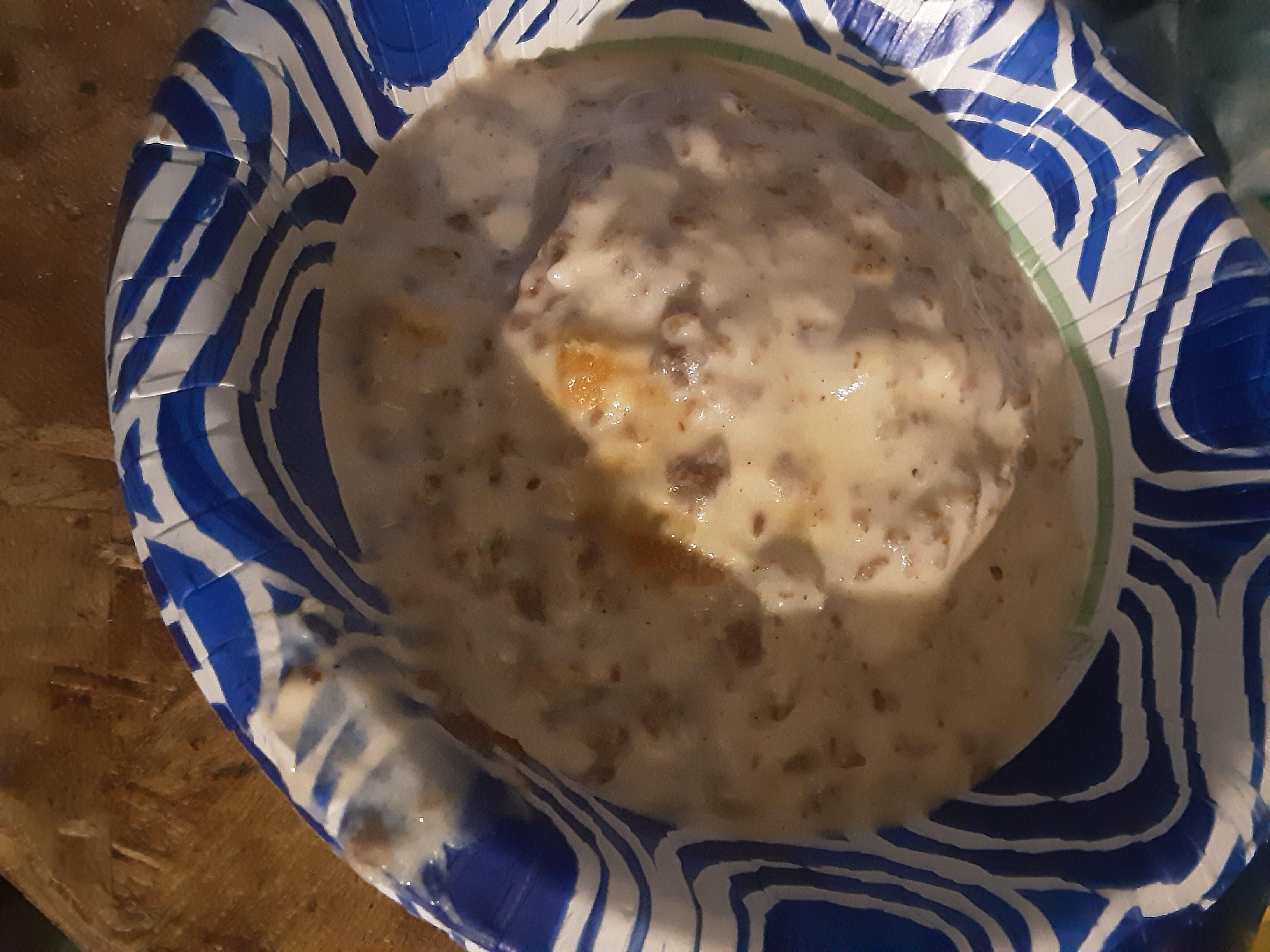 Bitches and gravy and pork steak smothered in queso and fried onions. | Scrolller