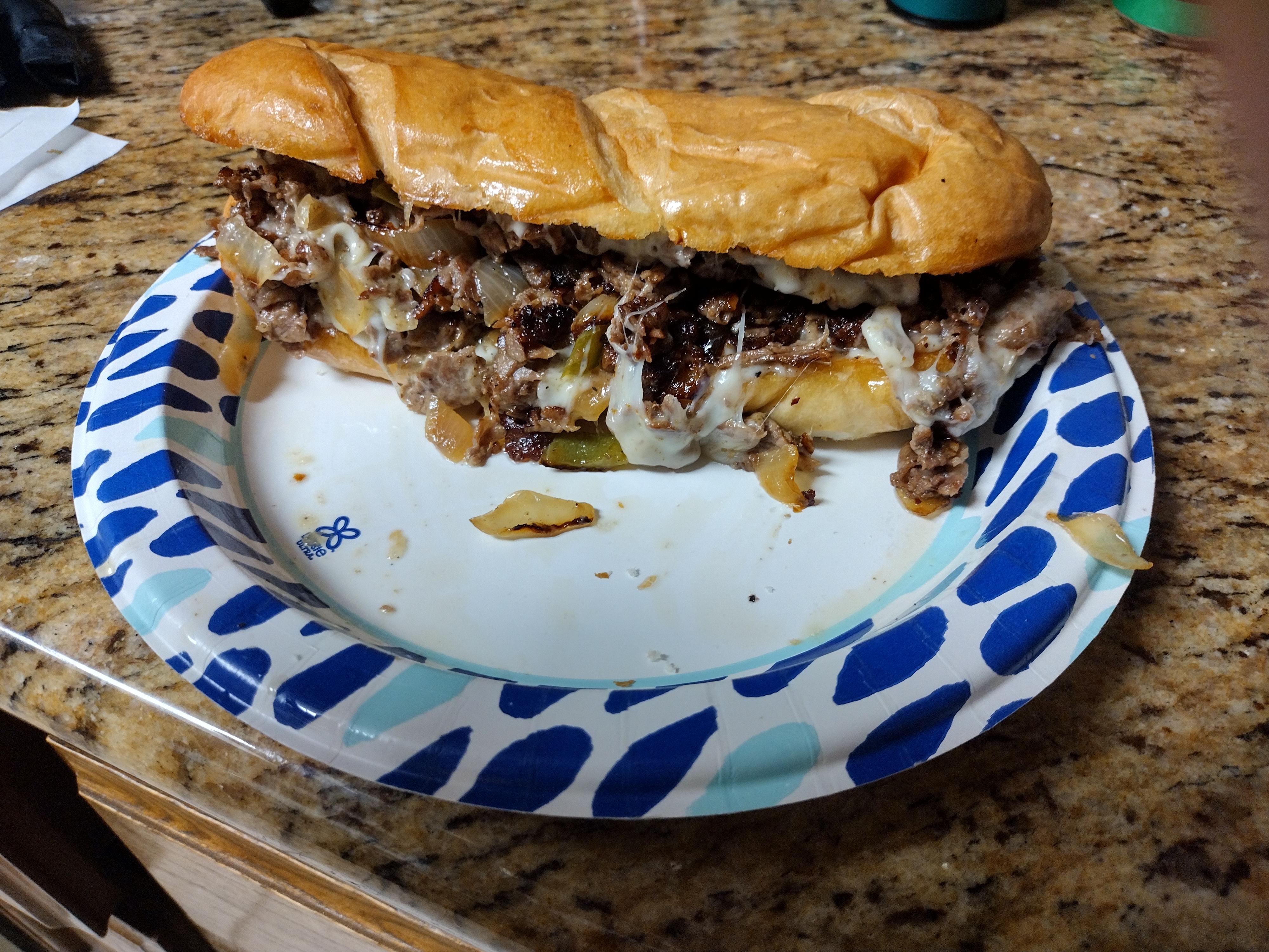 Cheesesteak with bell peppers, Monterey Jack cheese | Scrolller