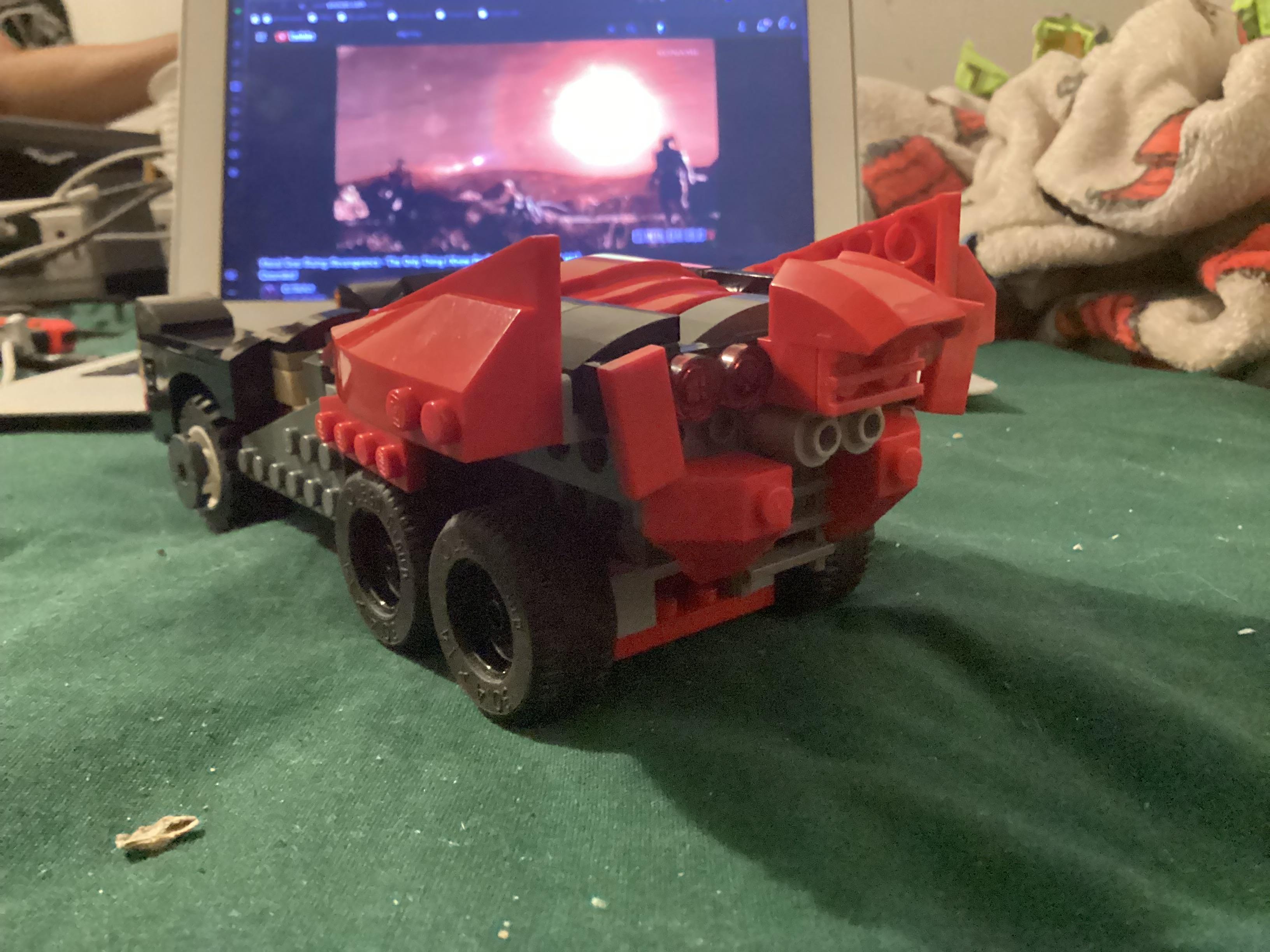 An MOC I slapped together with pieces of a Batmobile set and Ninjago mech, turned out pretty ...