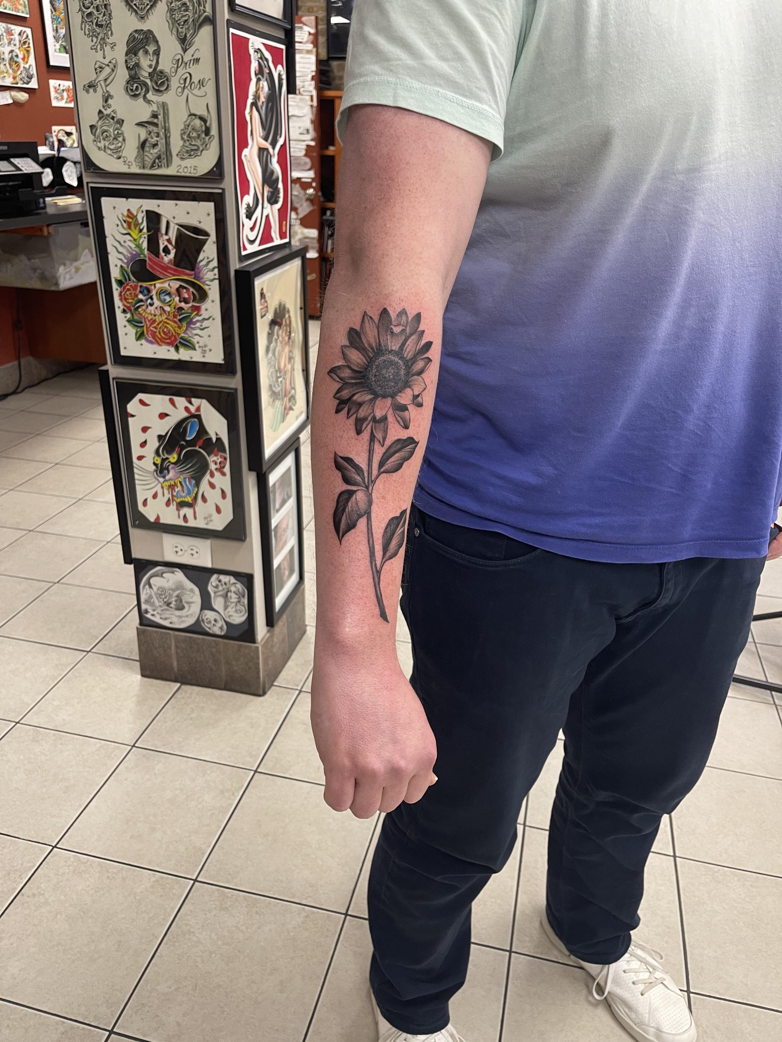 Sunflower done by Quori Senyon @ Deluxe Tattoo in Chicago, IL | Scrolller