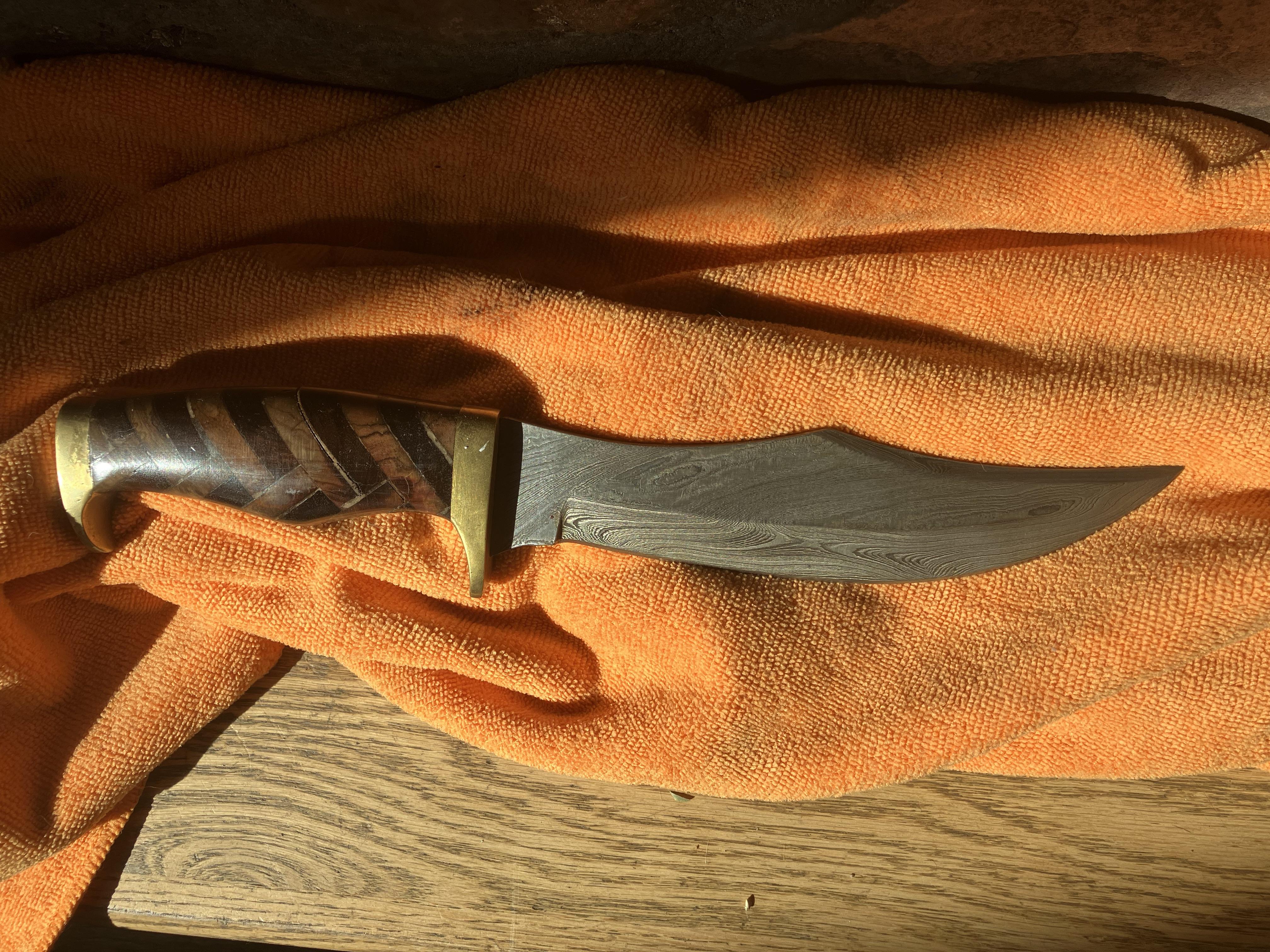 Curious about why some Damascus steel has a tactile texture, almost topographical in nature ...