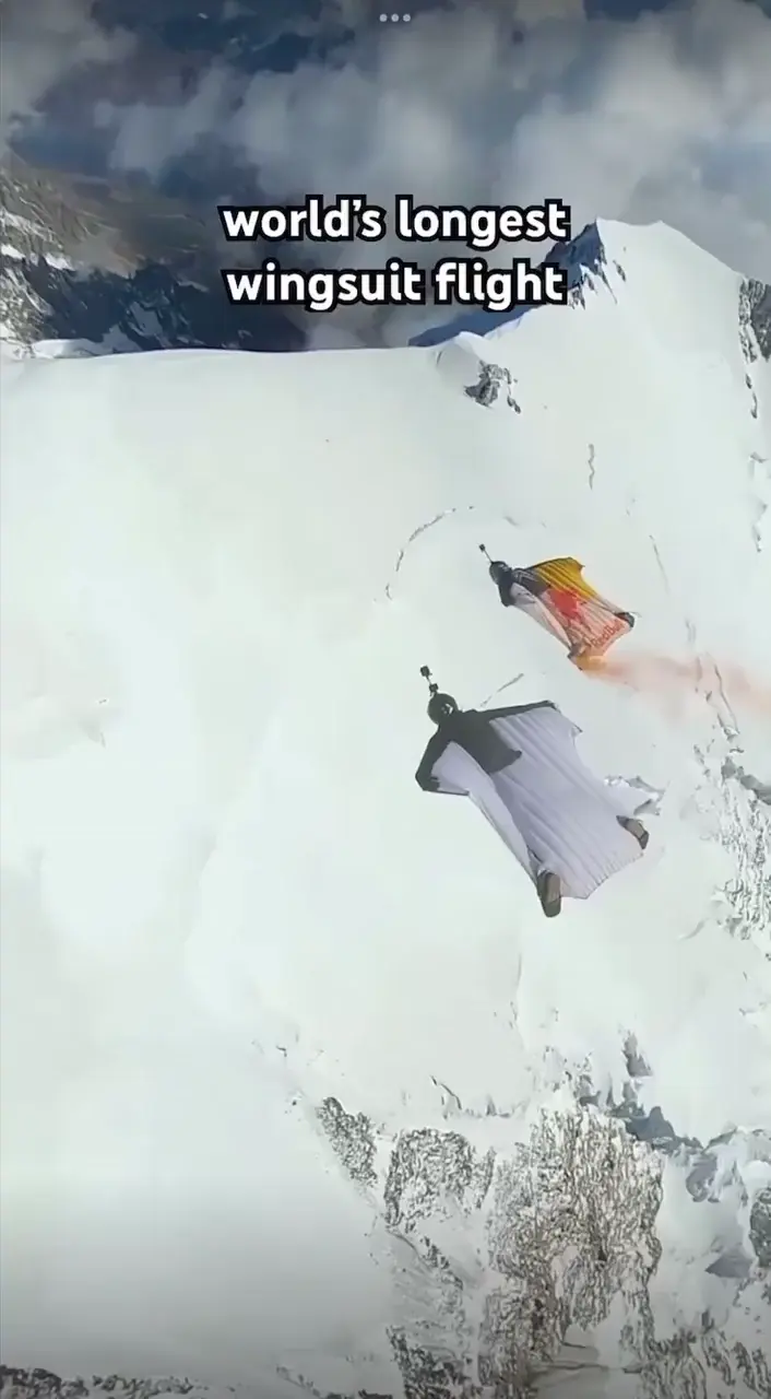 World’s longest wingsuit flight | Scrolller