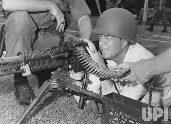 Portraits and photos of presidents exercising their Second Amendment rights of using guns ...