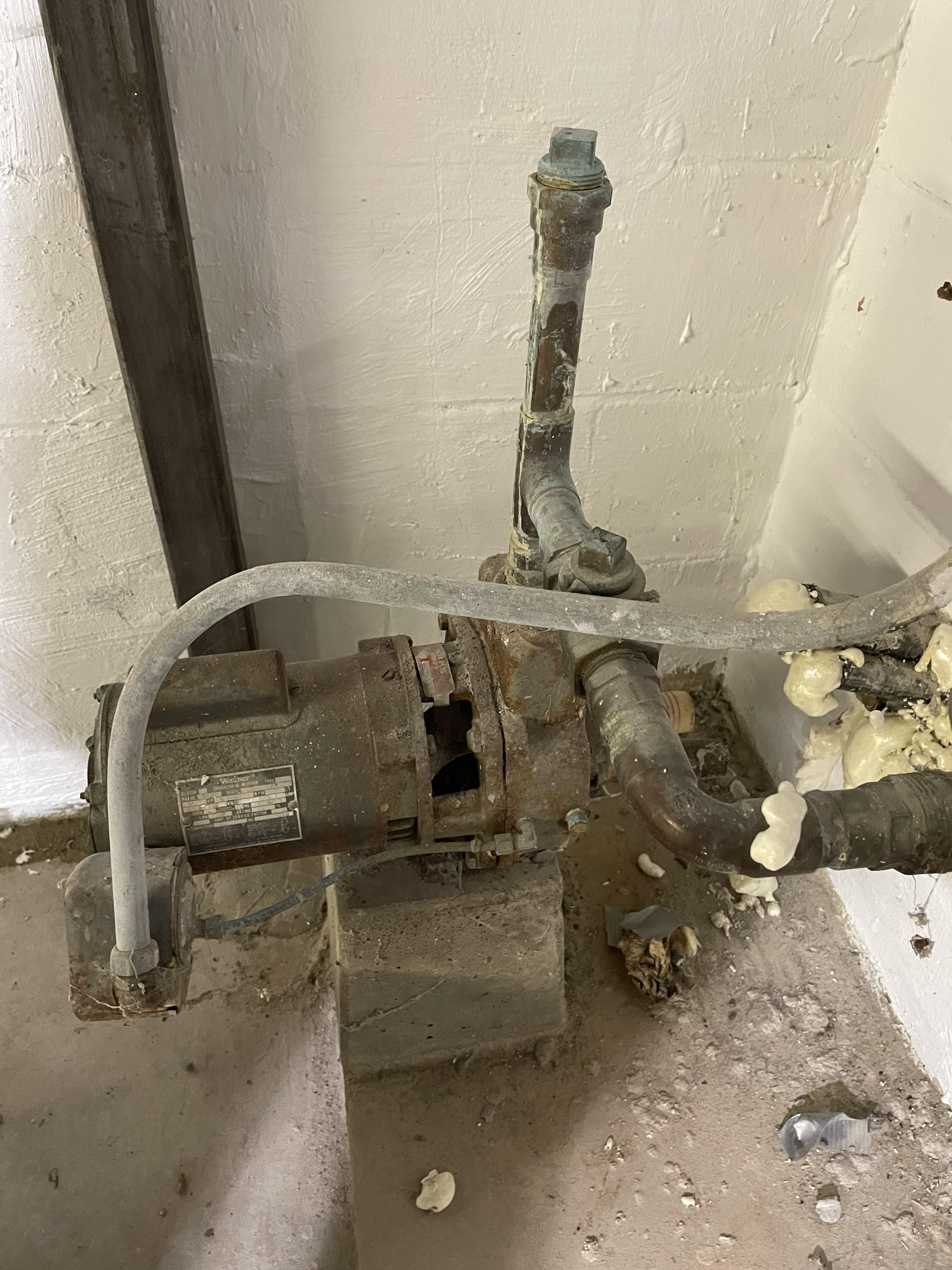 Pump in basement | Scrolller