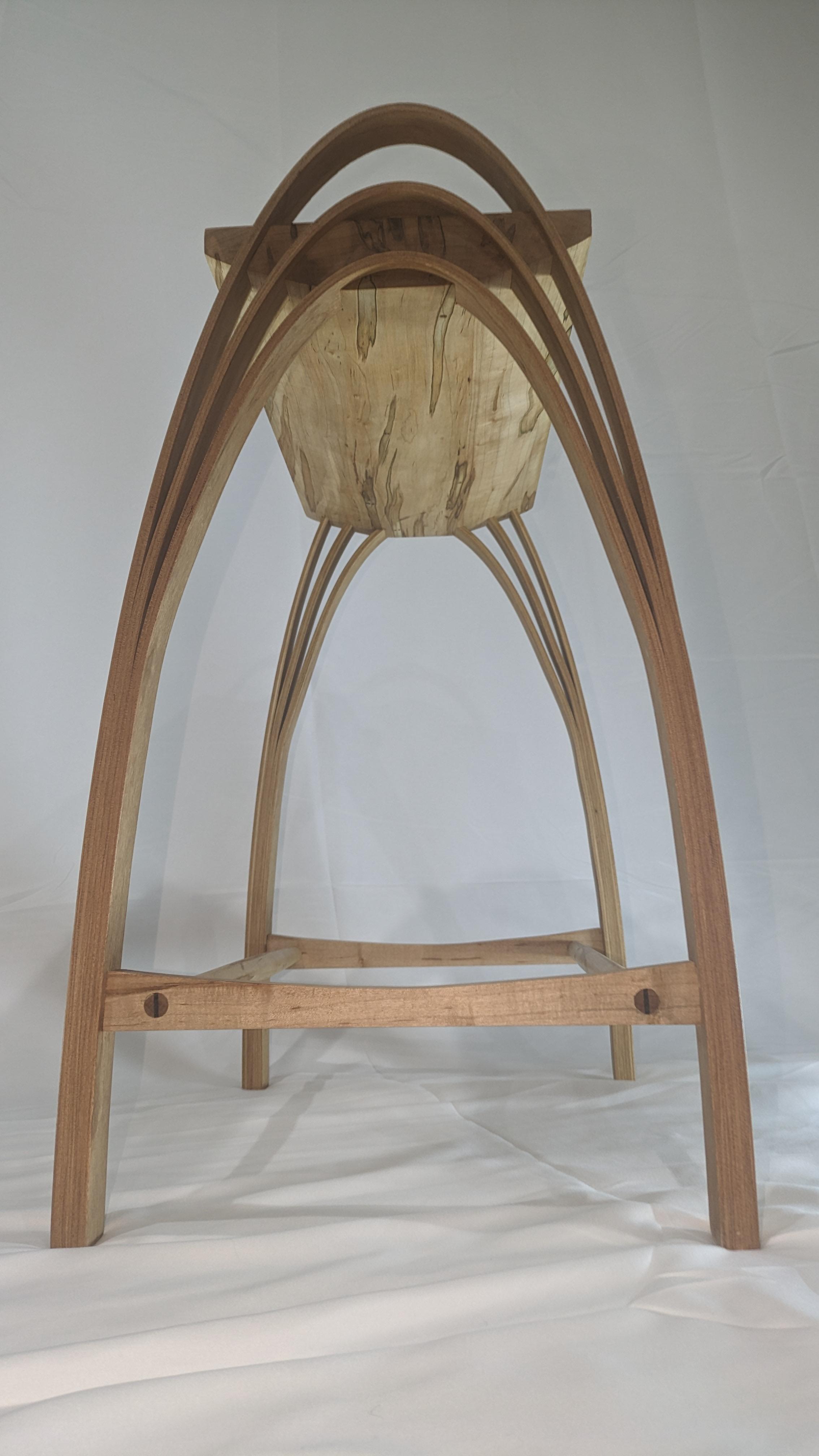 Nestled Archwood Stool | Scrolller