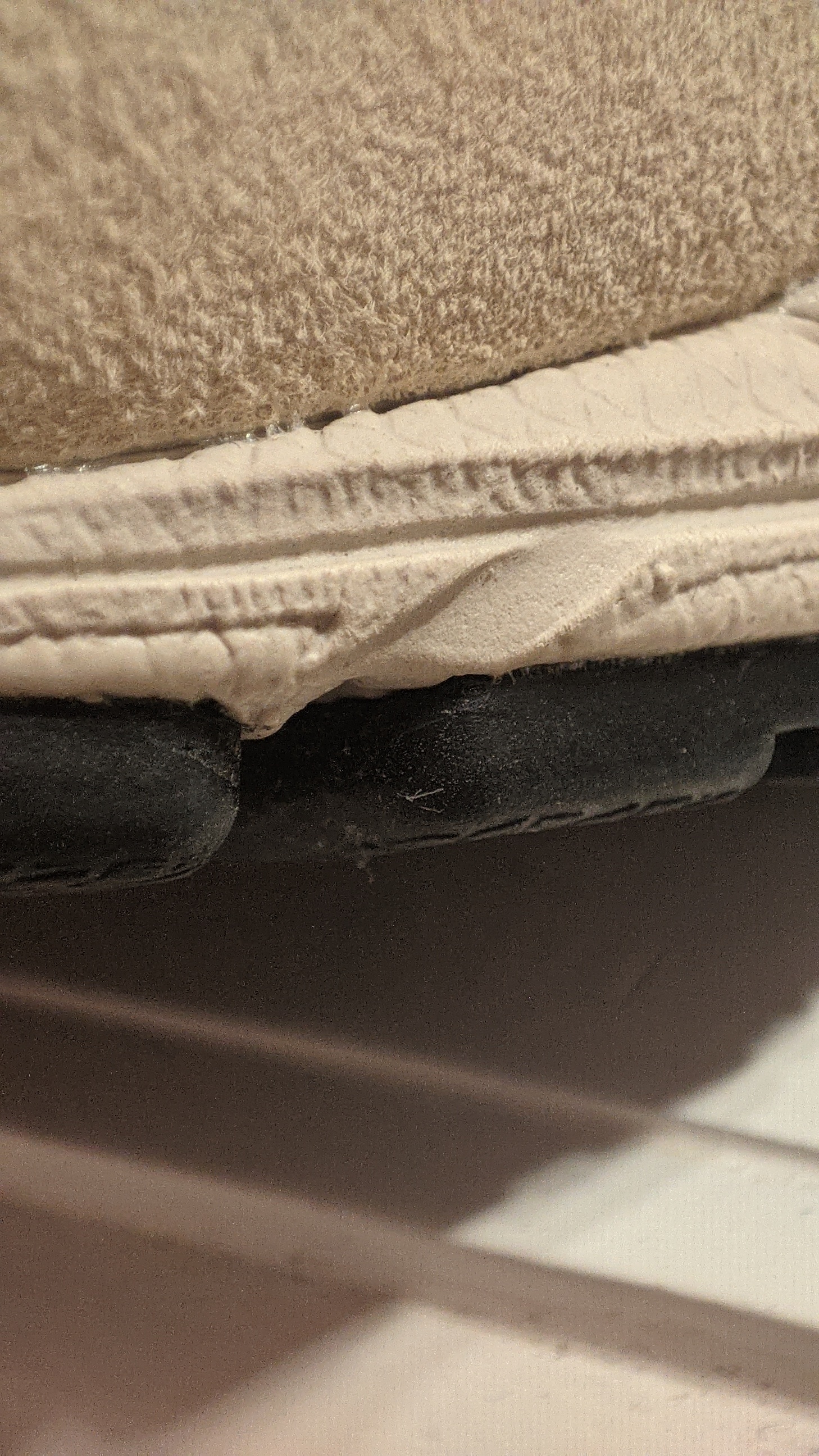 Is this a manufacturing defect or did I accidentally get something cut here? Left and right shoe ...